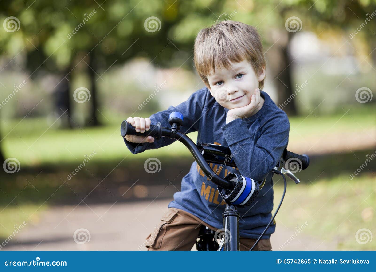 Boy Ride a Bicycle in City Park Stock Image - Image of activity ...