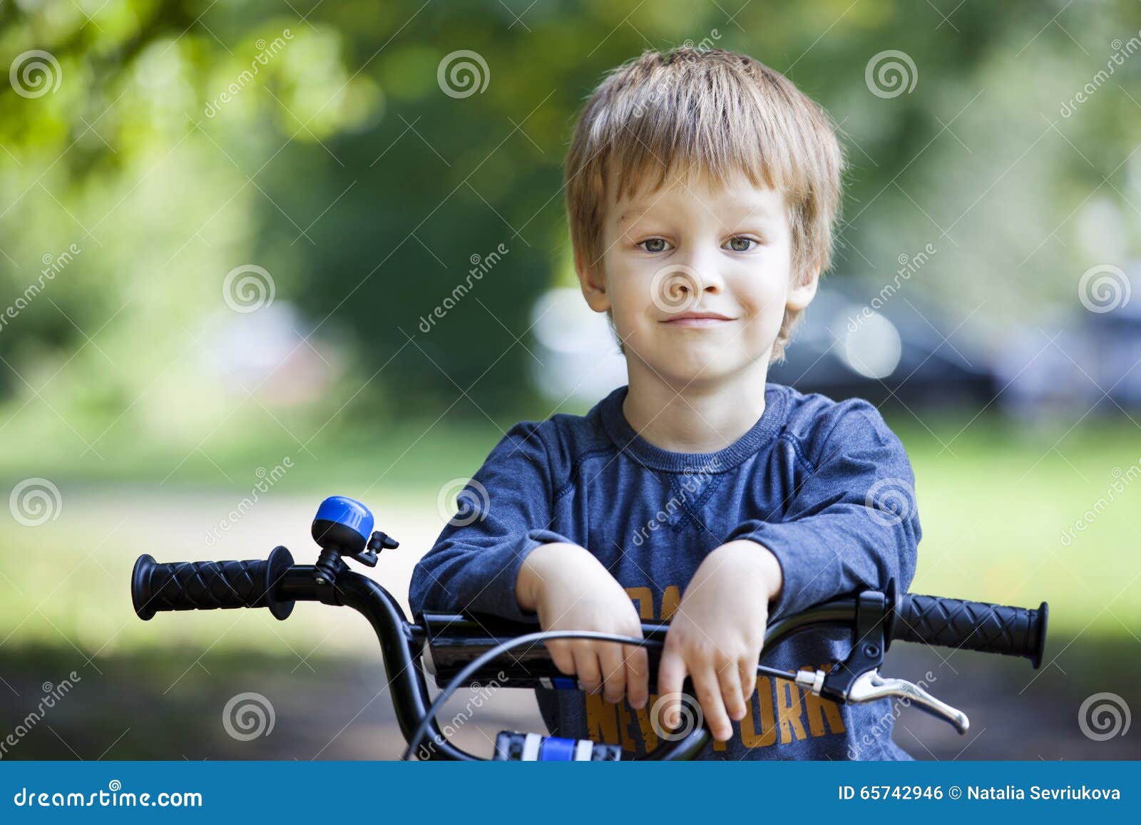 Boy Ride a Bicycle in City Park Stock Photo - Image of driver, cyclist ...