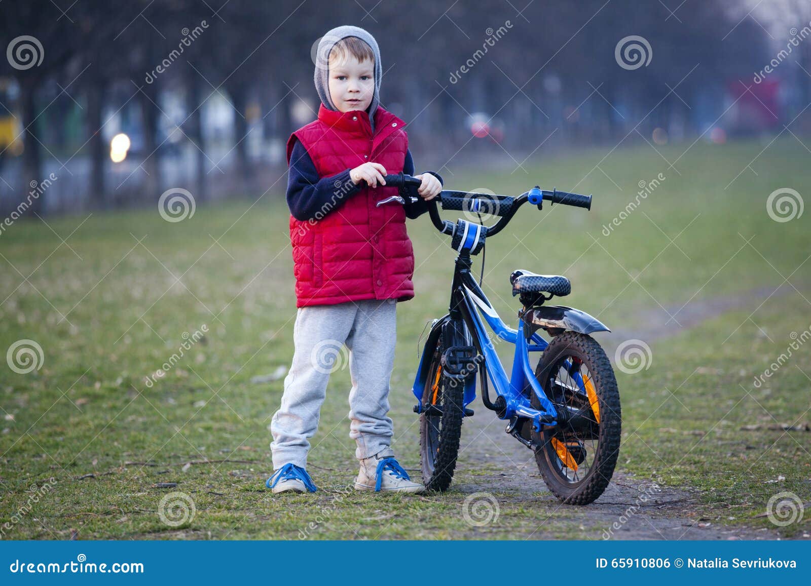 Boy Ride a Bicycle in City Park Stock Photo - Image of outdoor, helmet ...