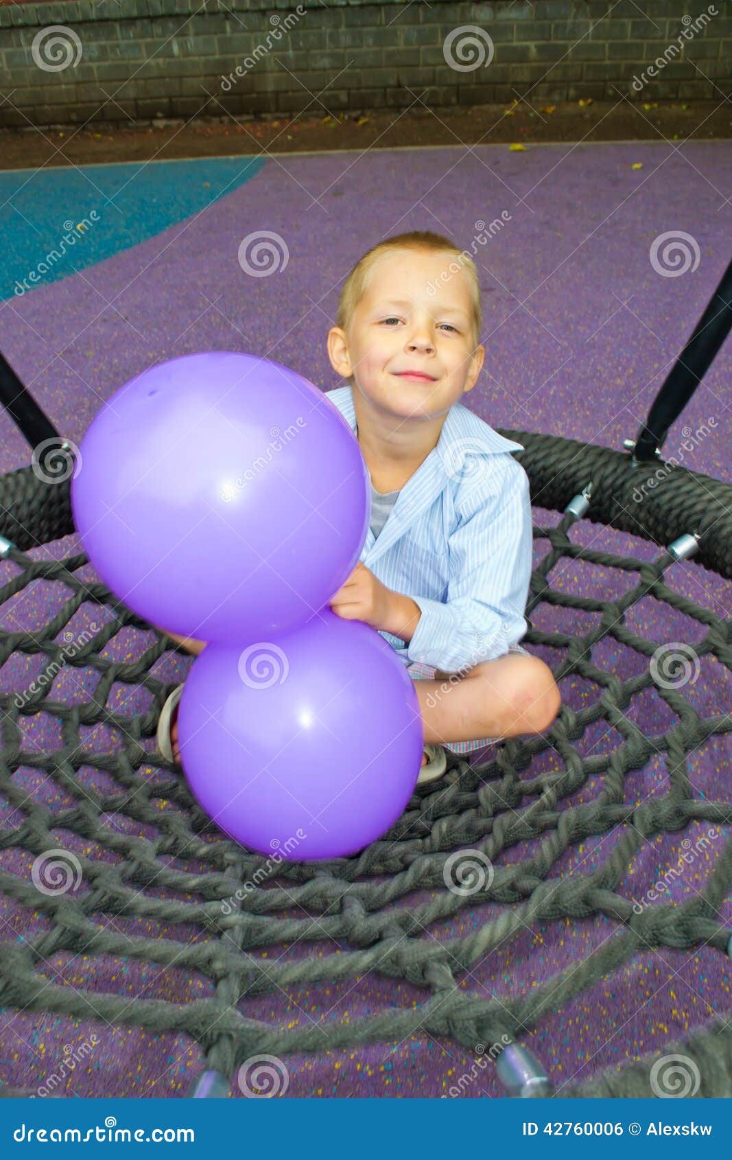 Boy ride on a swing stock photo. Image of baby, evening - 42760006