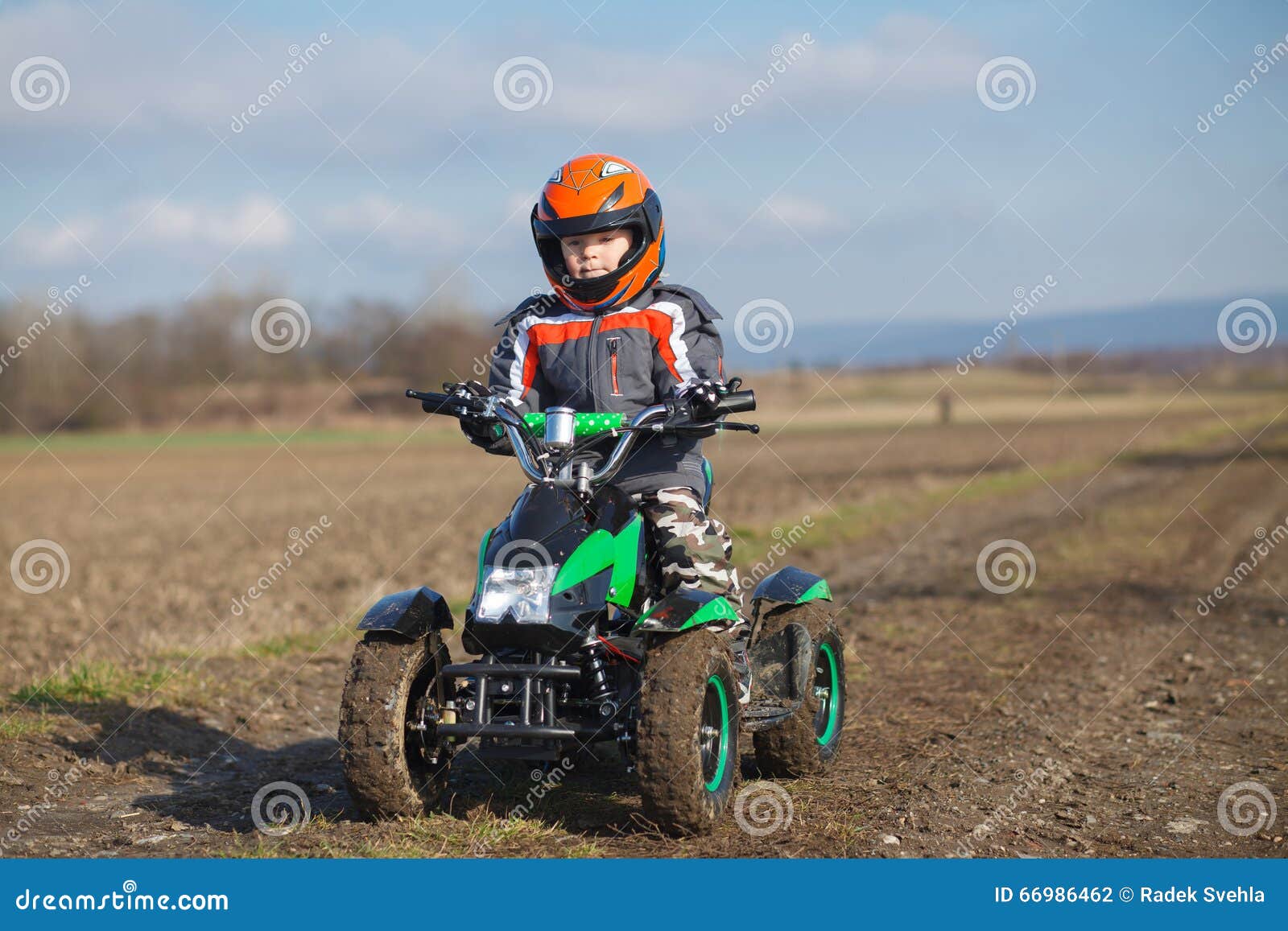 Boy Rides on Electric ATV Quad. Stock Photo - Image of motorsport ...