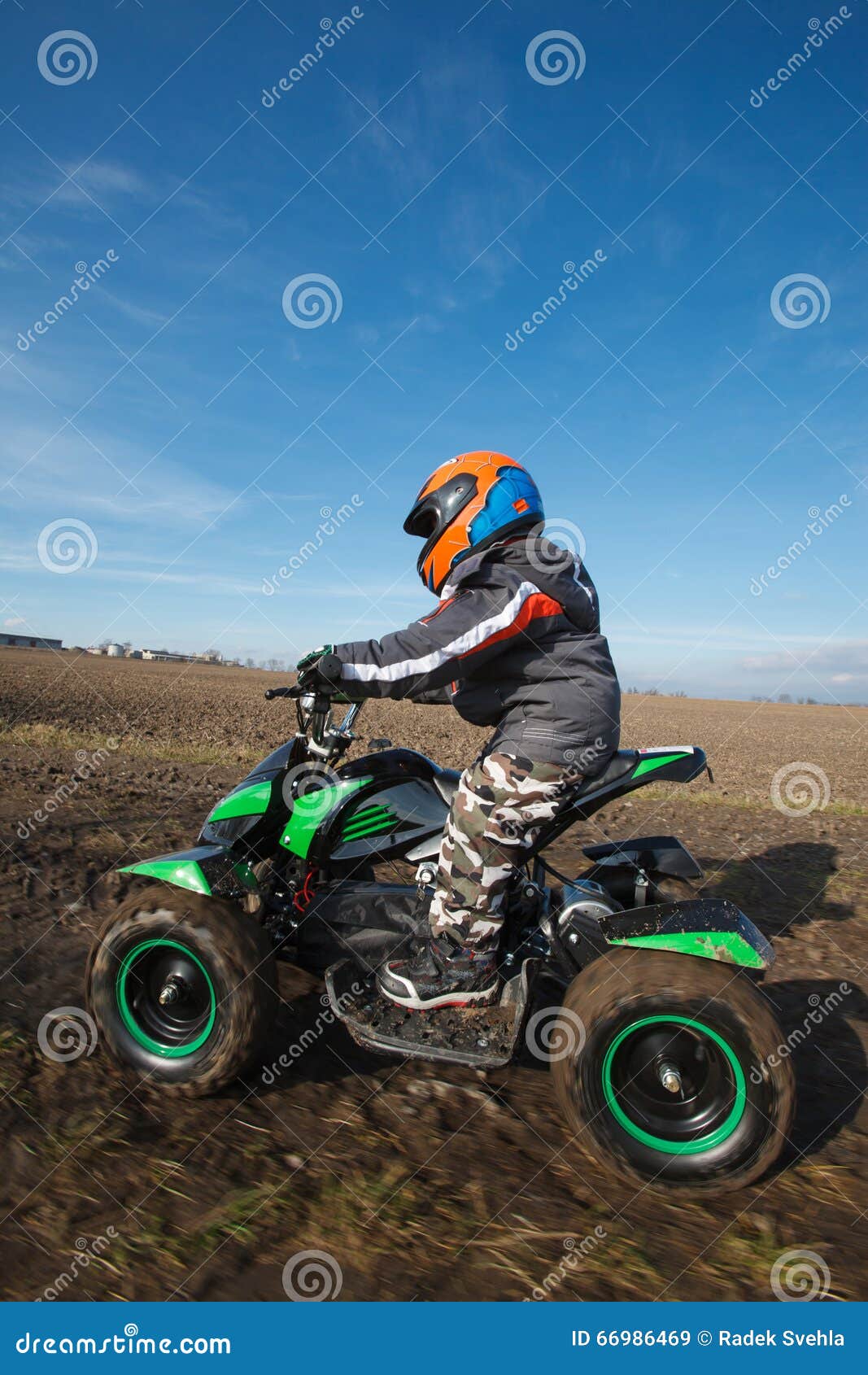 Boy Rides on Electric ATV Quad. Stock Image - Image of motorsports ...