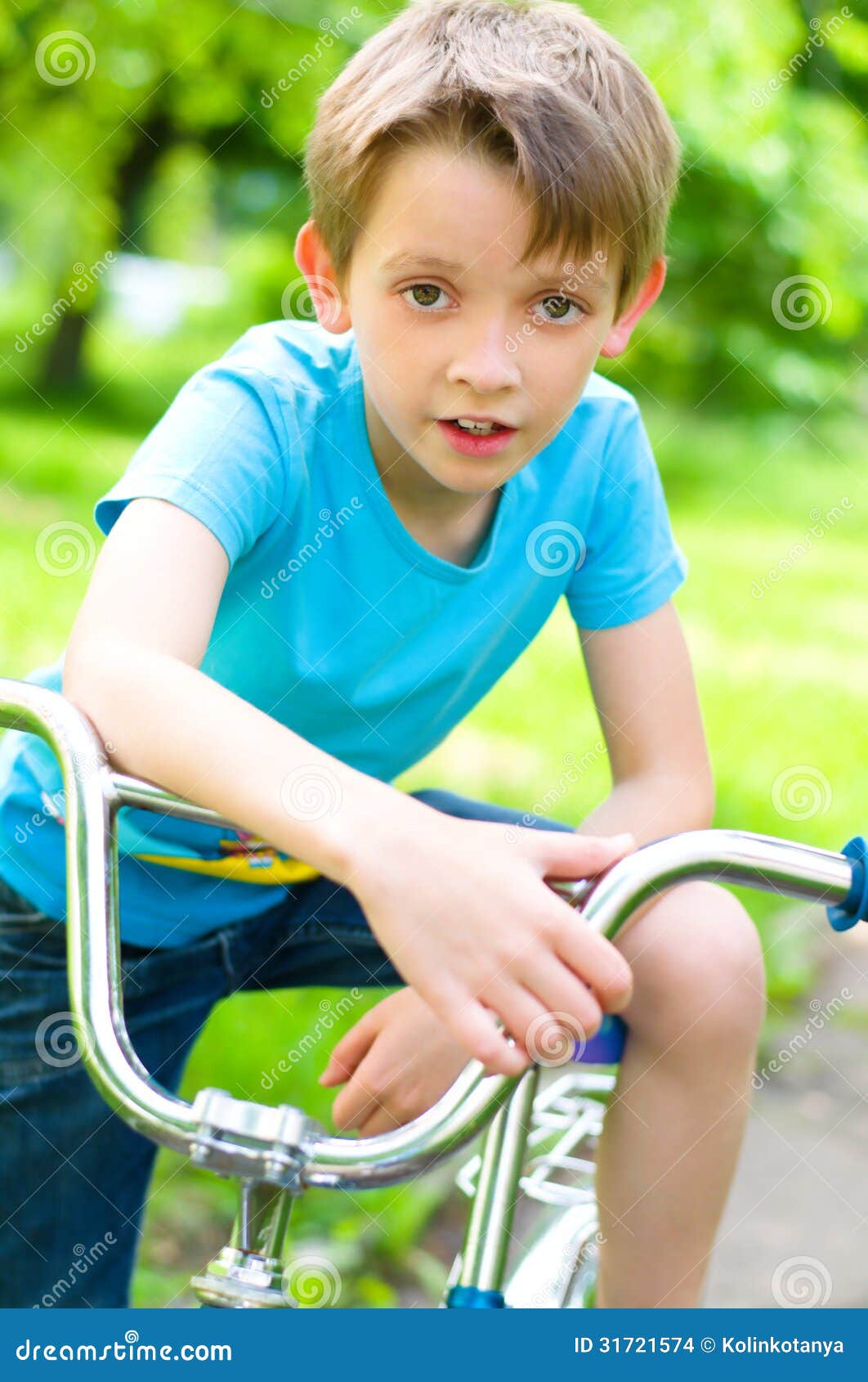 Boy riding bicycle stock photo. Image of look, cute, male - 31721574