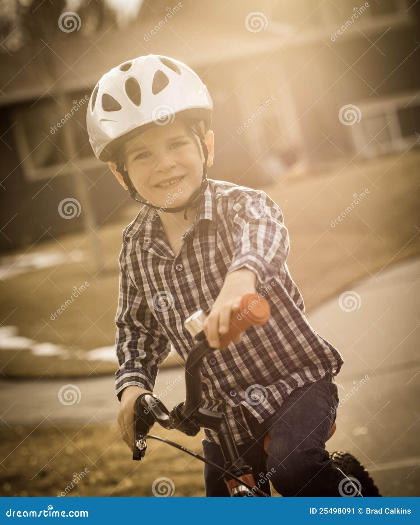 Boy riding bike stock image. Image of street, expressions - 25498091