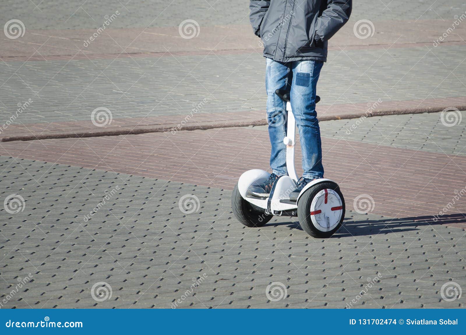 Boy Riding a Hoverboard in the Square Stock Photo - Image of child ...