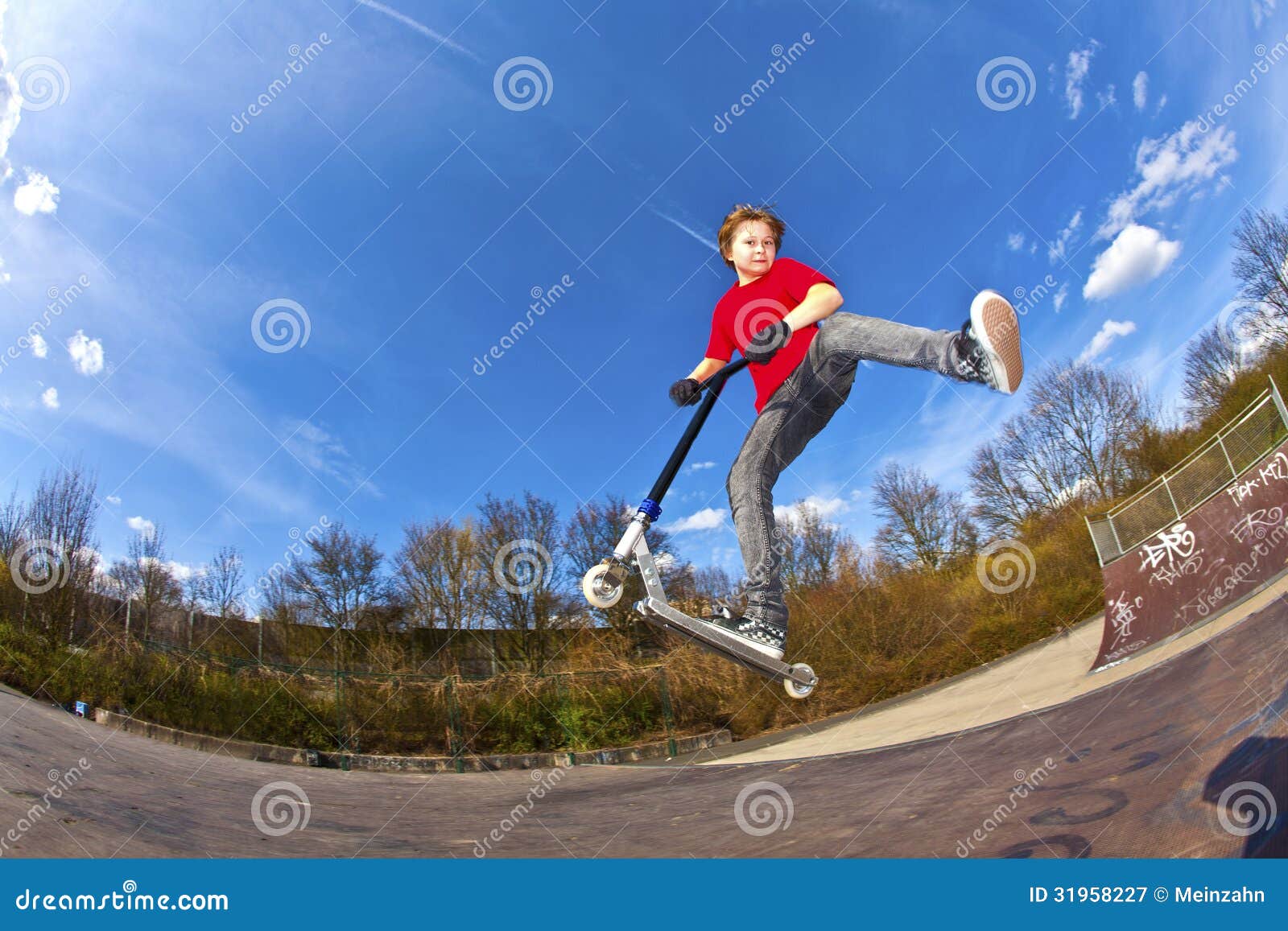 Boy Riding a Scooter is Jumping Stock Image - Image of halfpipe, brown ...