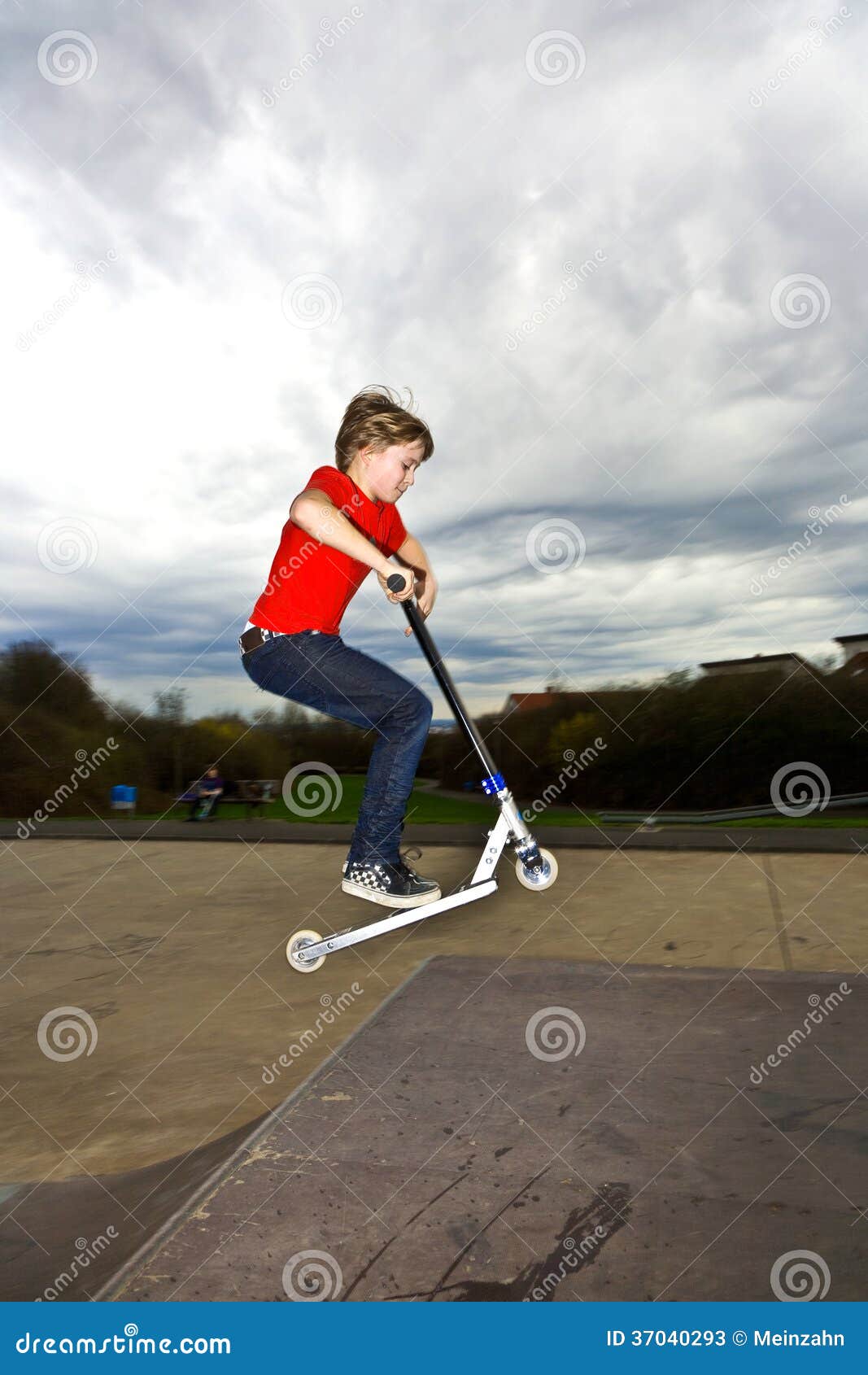 Boy Riding a Scooter is Jumping at Stock Image - Image of face ...