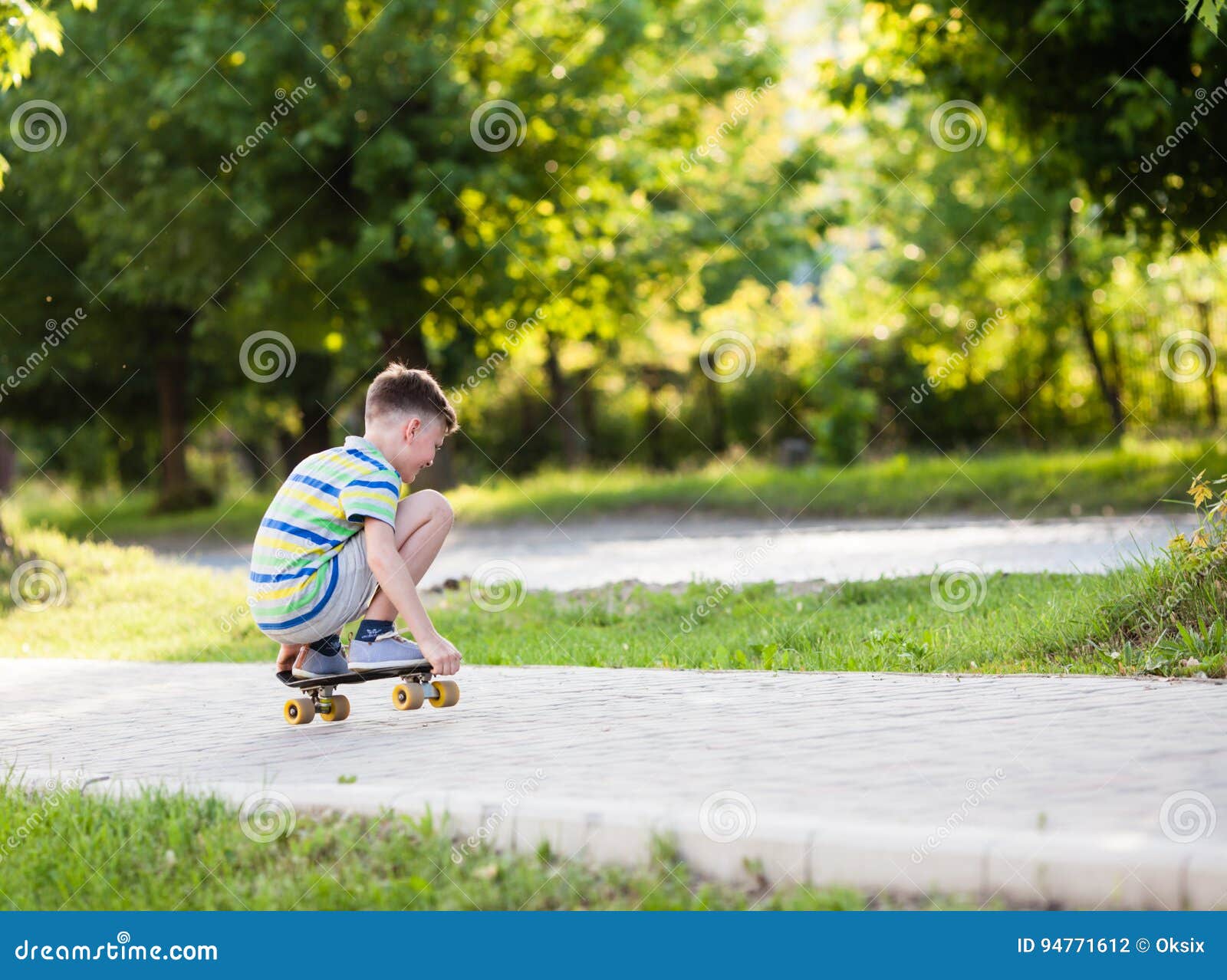 Boy riding a skateboard stock photo. Image of summer - 94771612