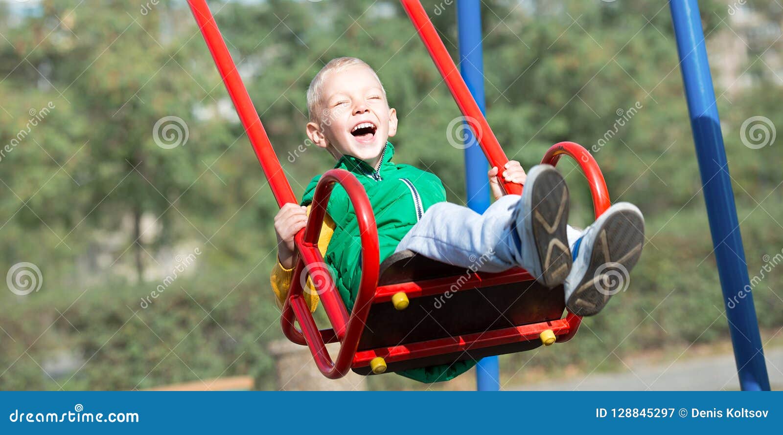 A Boy is Riding on a Swing. a Happy Weekend. Stock Image - Image of ...