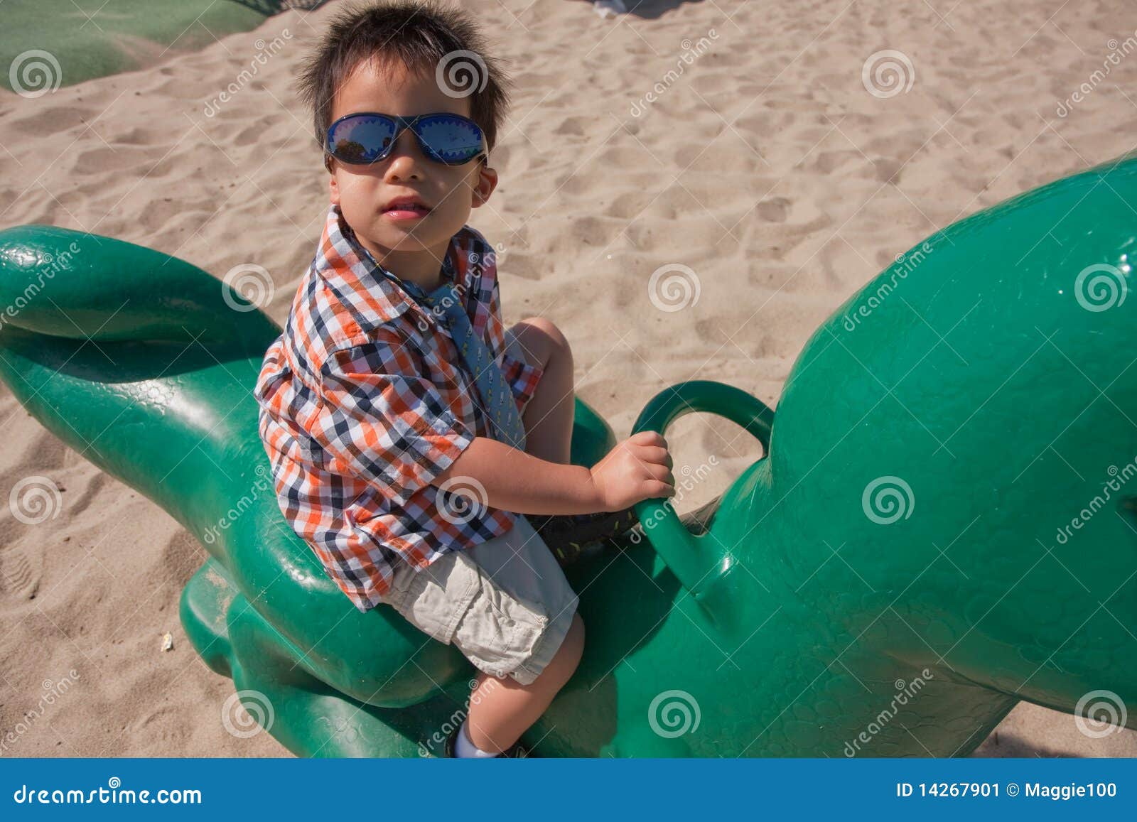 Boy riding a toy dragon stock image. Image of sport, people - 14267901