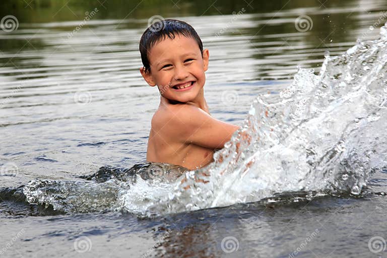 Boy in river stock image. Image of swimmer, childhood - 16290559
