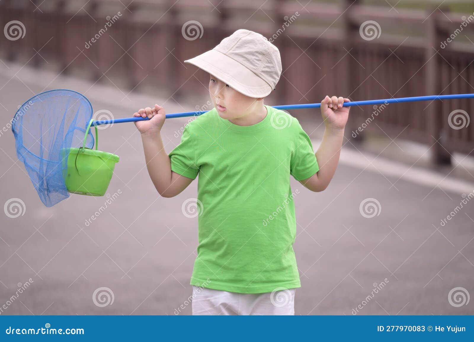 Boy Catching Fish with a Fishing Net Stock Image - Image of fishpond ...