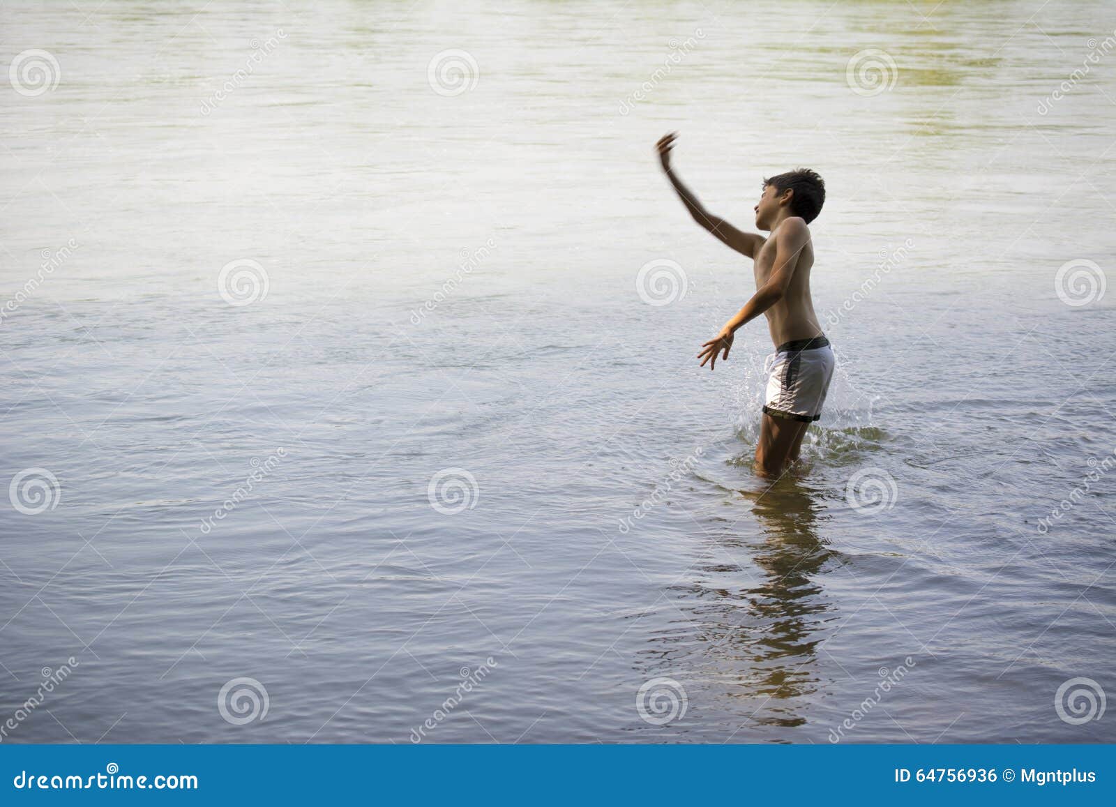 Boy and a river stock photo. Image of burst, summer, swimmer - 64756936