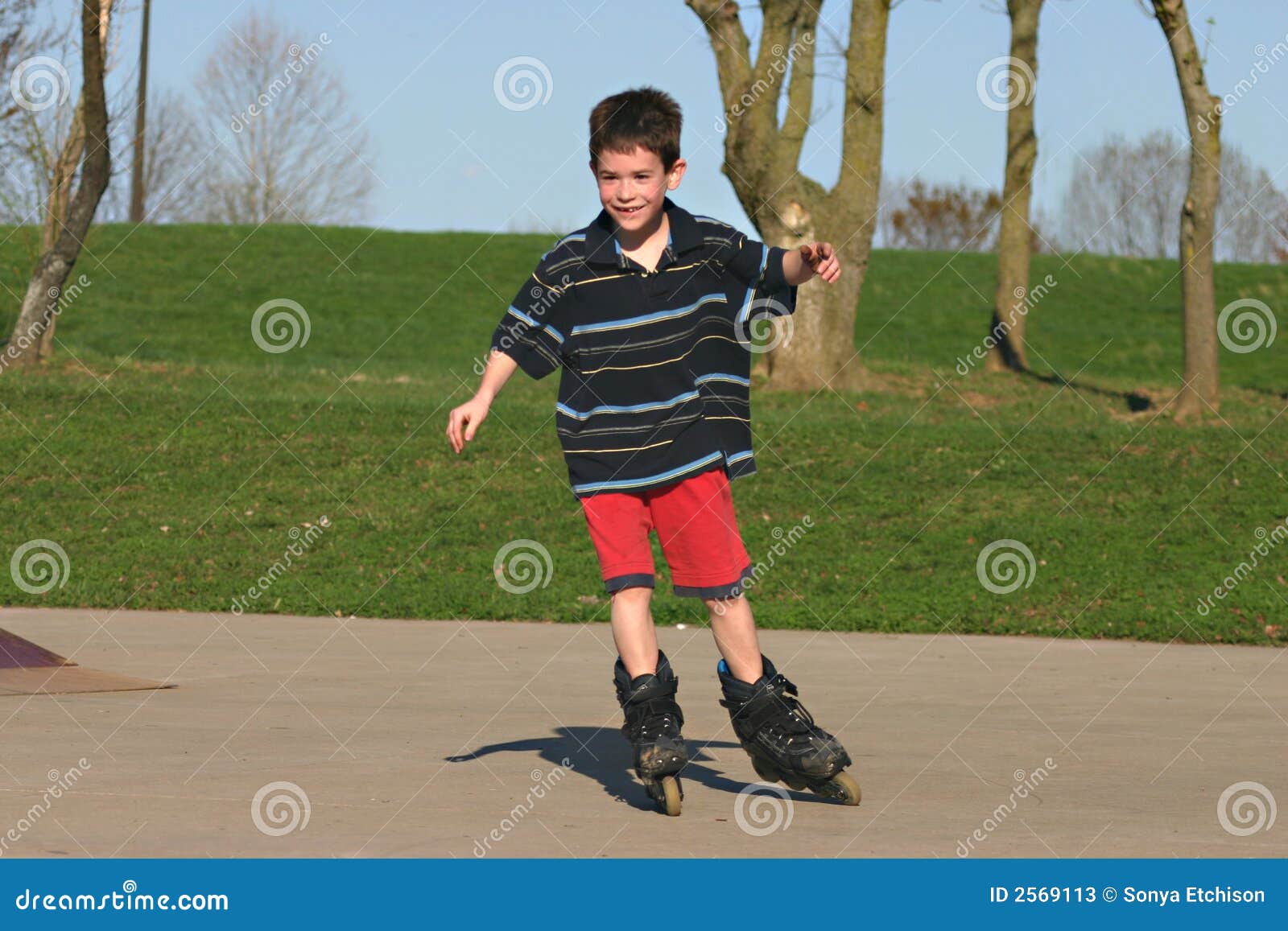 Boy Roller-Blading stock image. Image of caucasian, offspring - 2569113