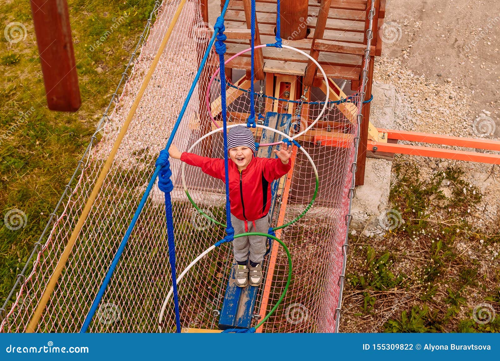 Boy on a rope town stock photo. Image of safety, high - 155309822