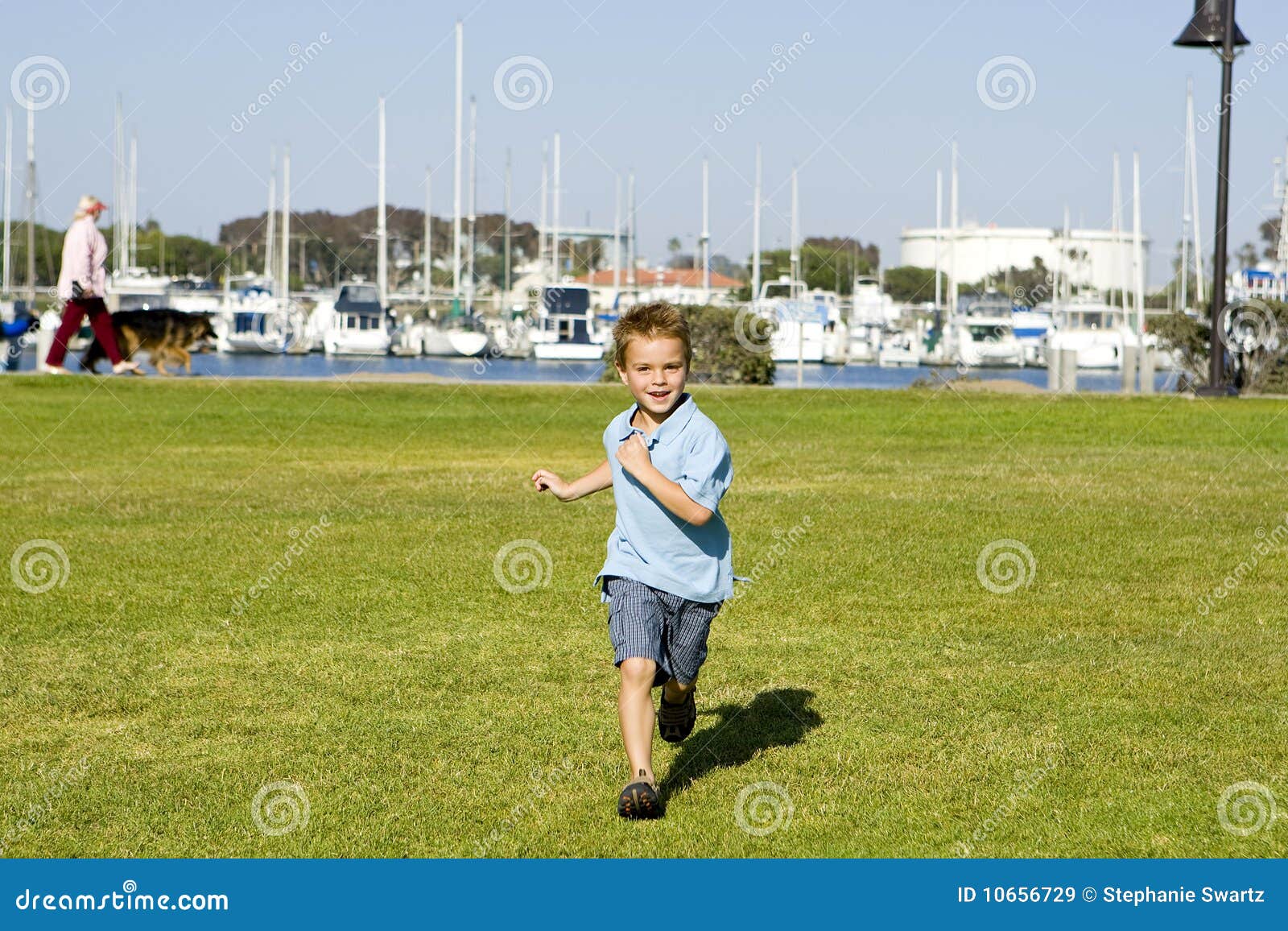 Boy running stock image. Image of green, caucasian, grass - 10656729