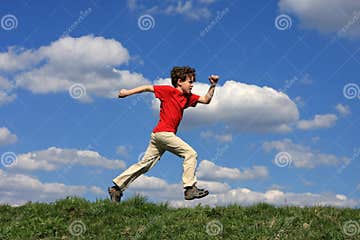 Boy running stock image. Image of cloudscape, happy, grass - 4919917