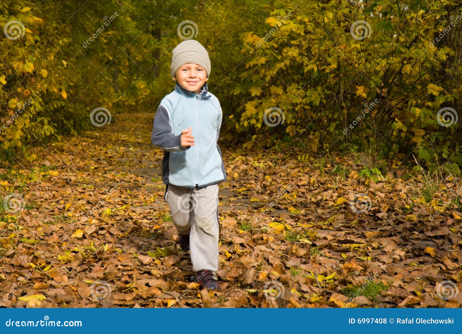 Boy Running in Autumn Scenery Stock Photo - Image of running, looking ...