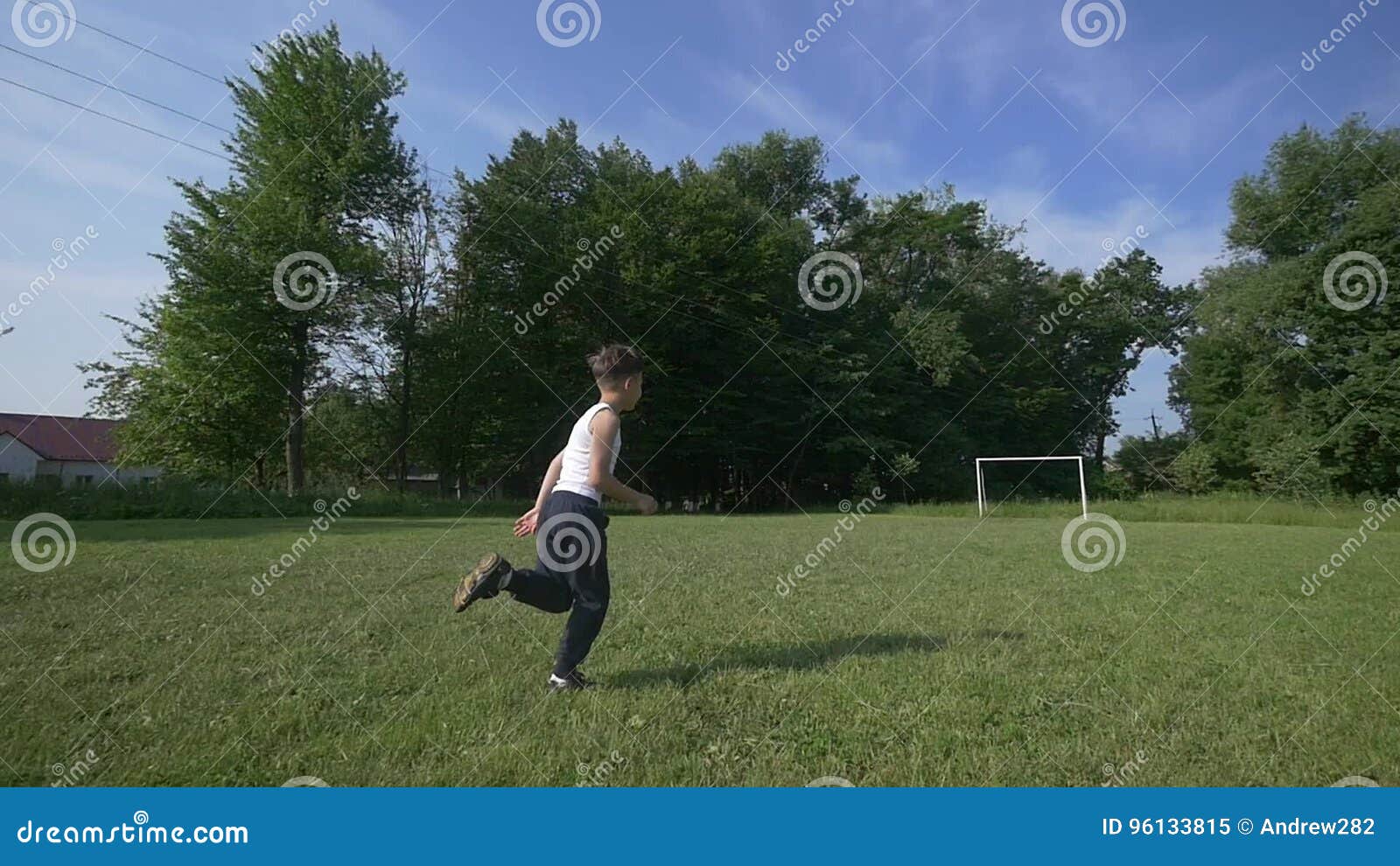 Boy Running by in Grass Slow Motion Stock Video - Video of caucasian ...