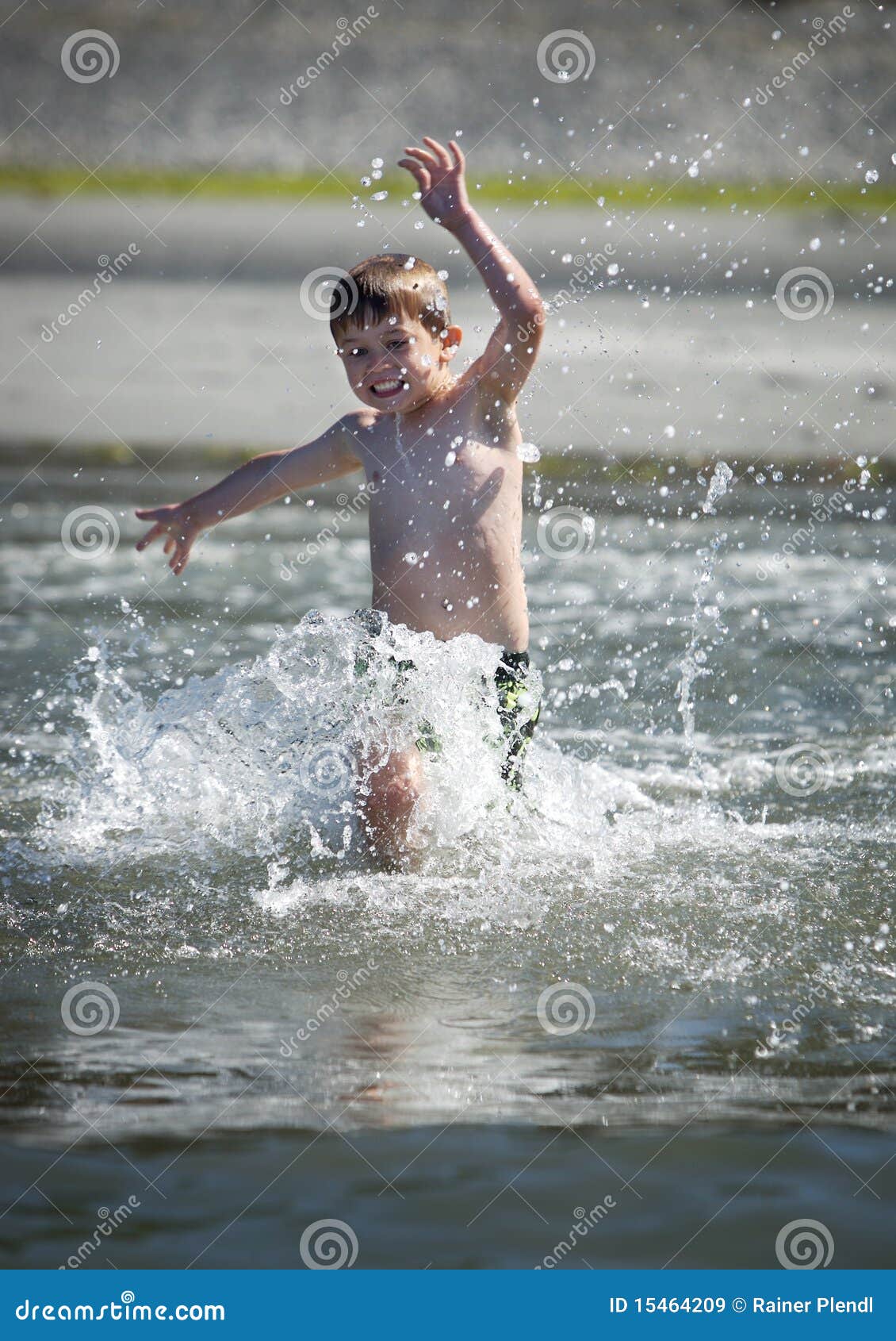 Boy running into ocean stock image. Image of holiday - 15464209