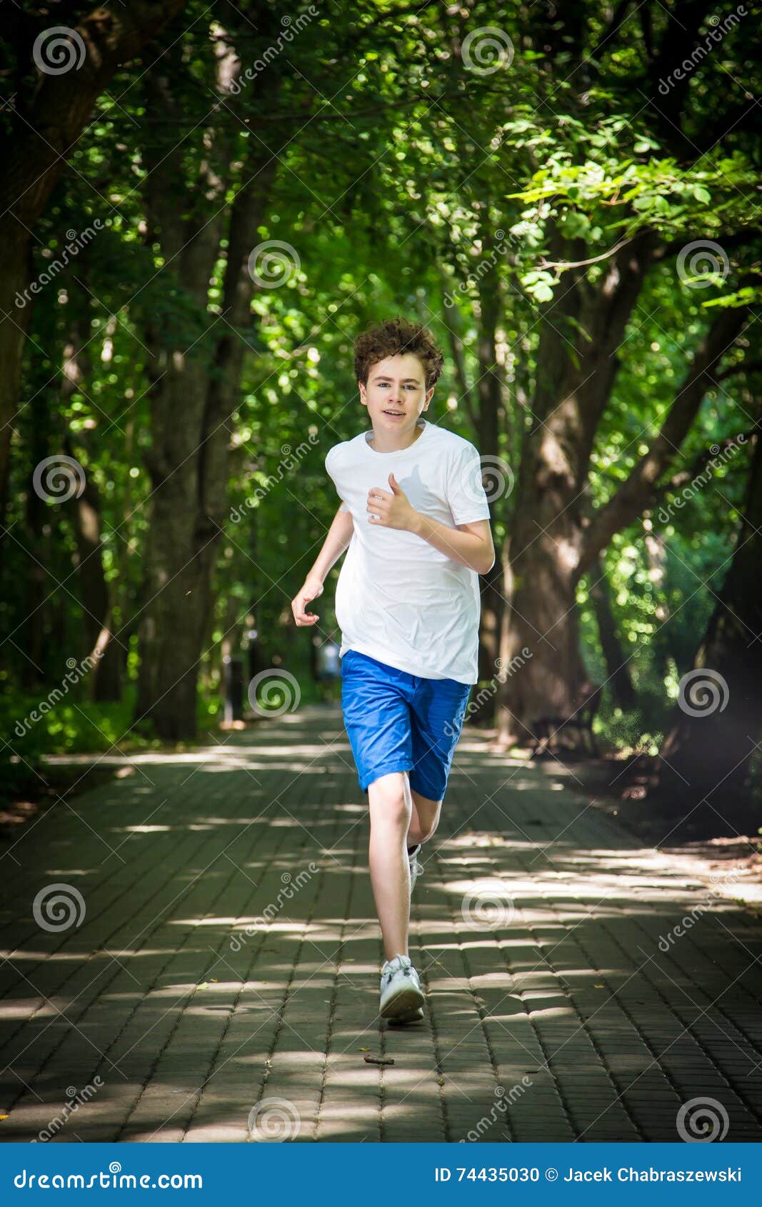 Boy running outdoor stock photo. Image of enjoying, lane - 74435030