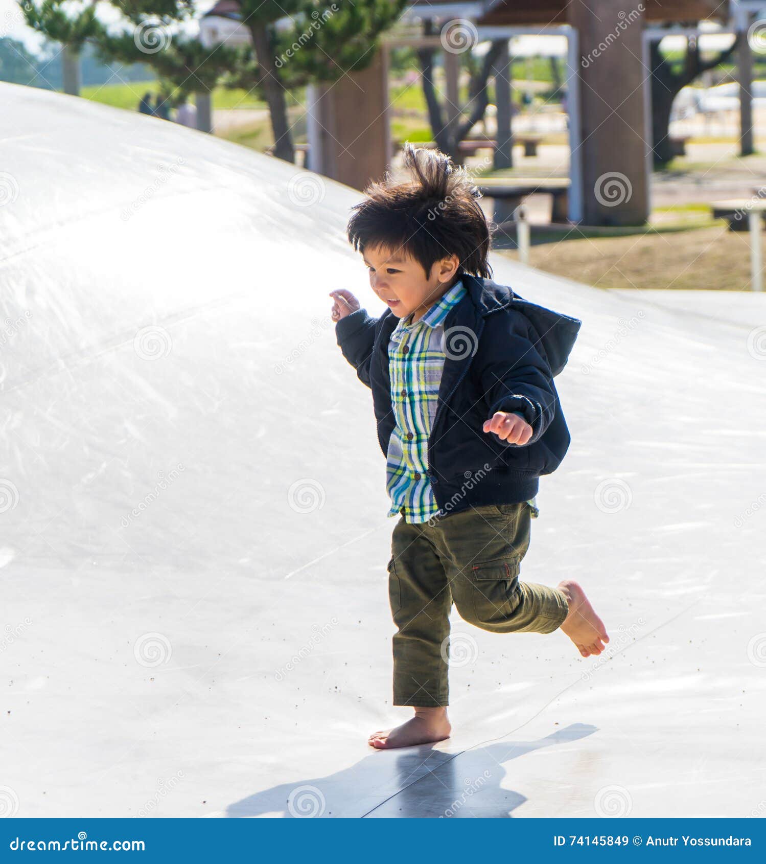 Boy Running in playground stock image. Image of summer - 74145849