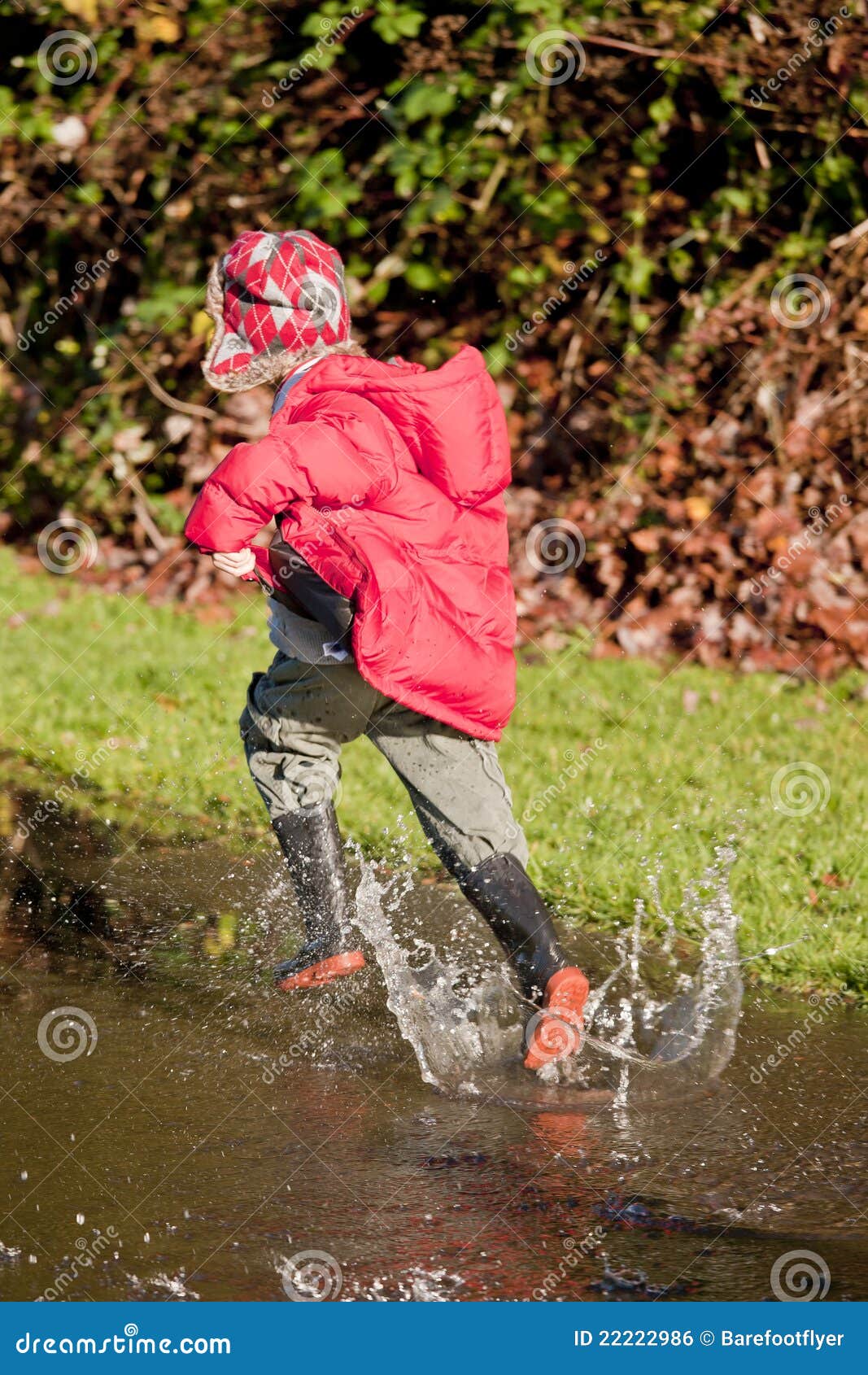 Boy Running through a Puddle Stock Photo - Image of human, lifestyle ...