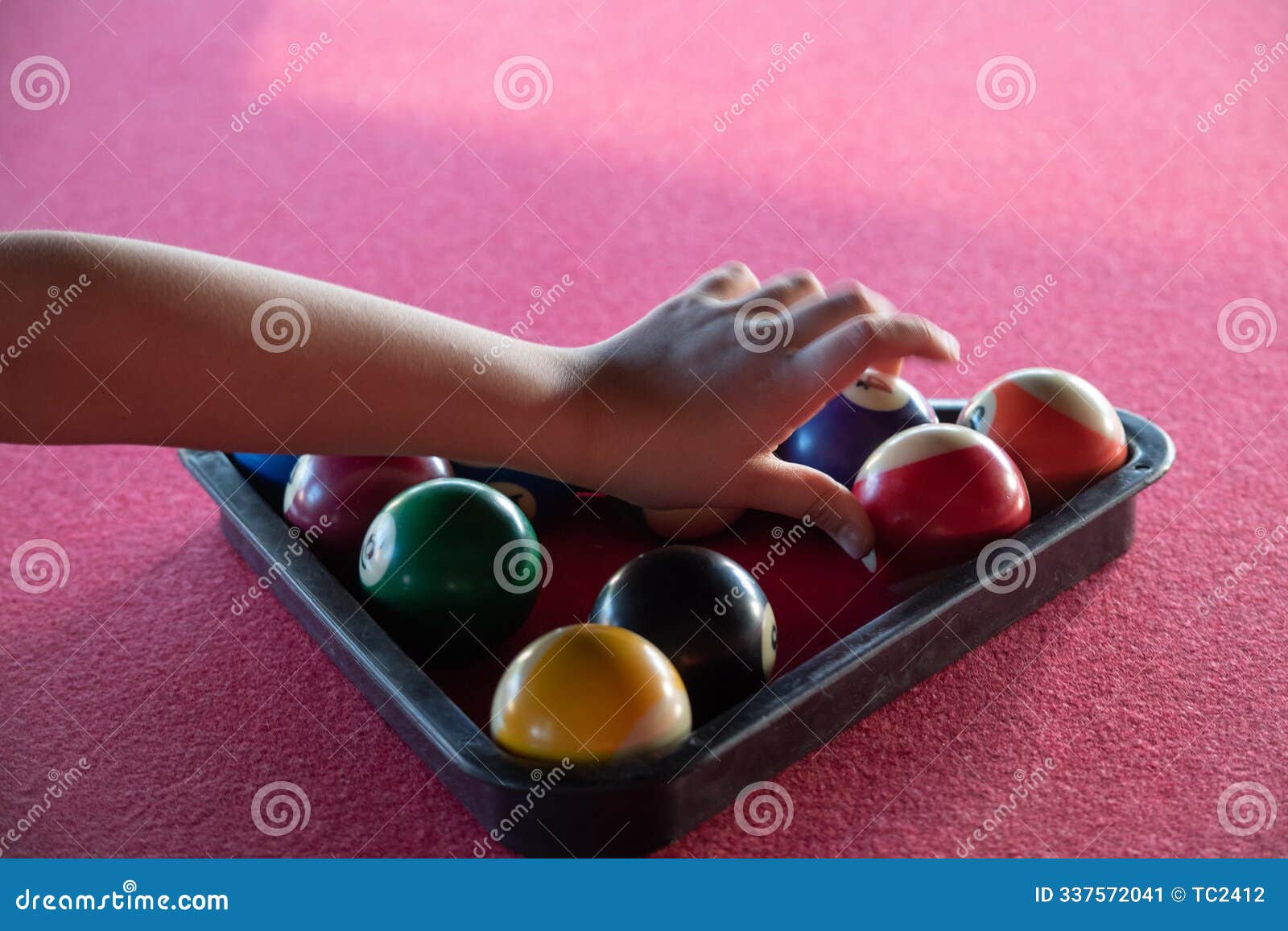 A Boy S Hand Arranging Pool Balls Stock Image - Image of concentration ...