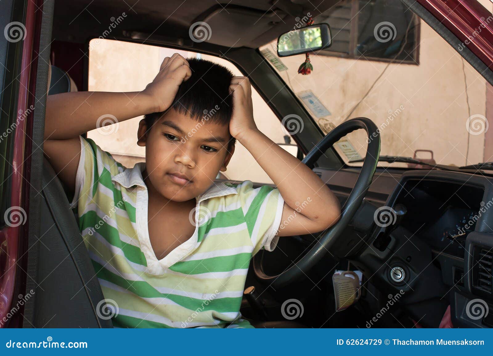 Boy sad alone in the car stock image. Image of auto, baby - 62624729