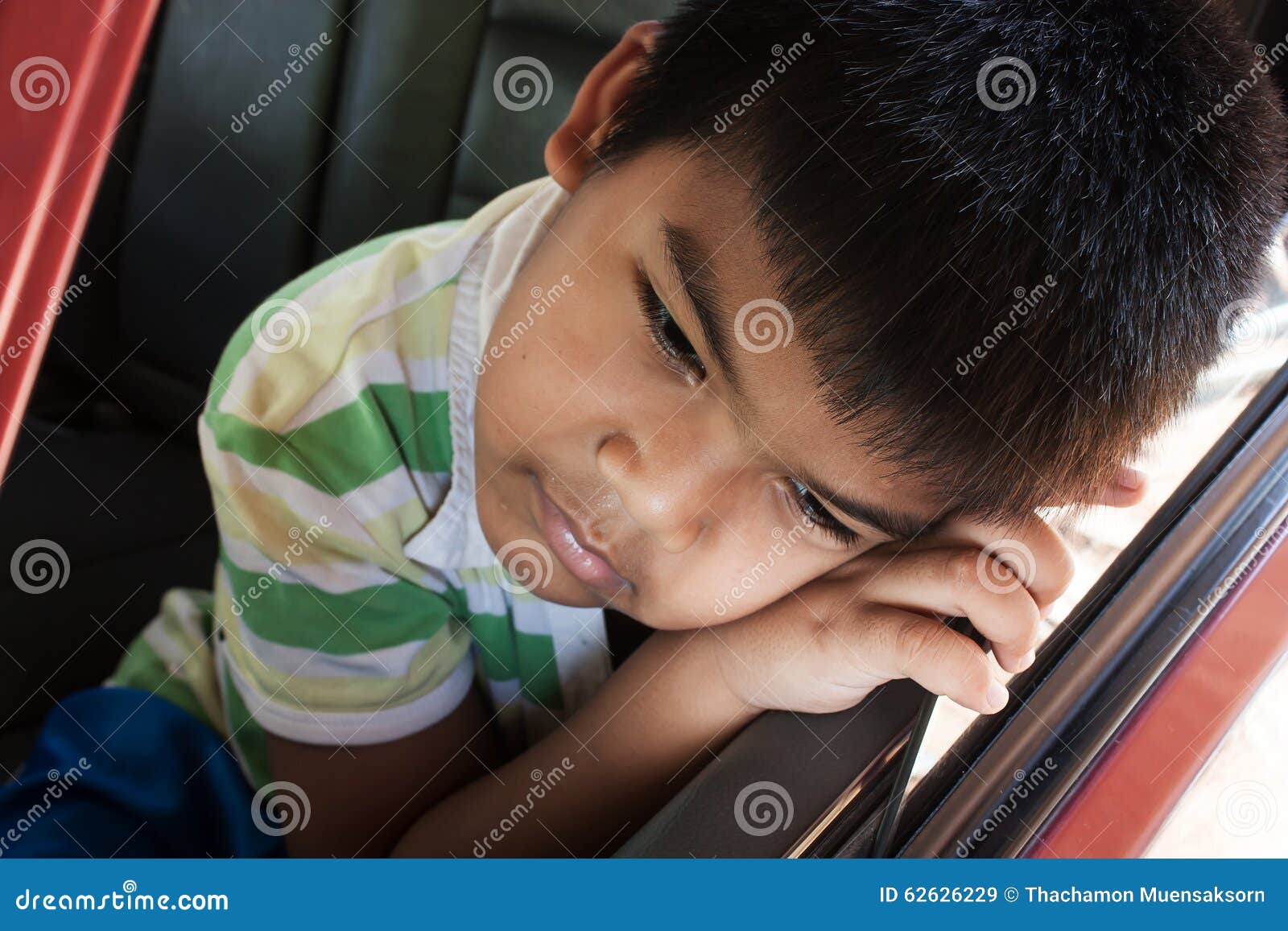 Boy sad alone in the car stock image. Image of care, expression - 62626229