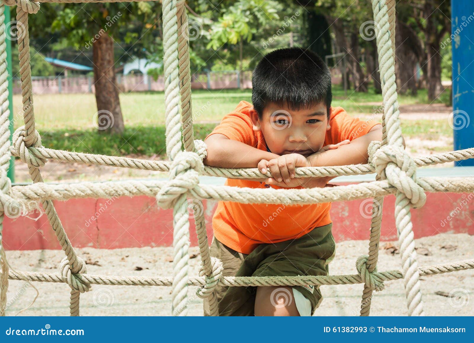 Child Alone In Playground