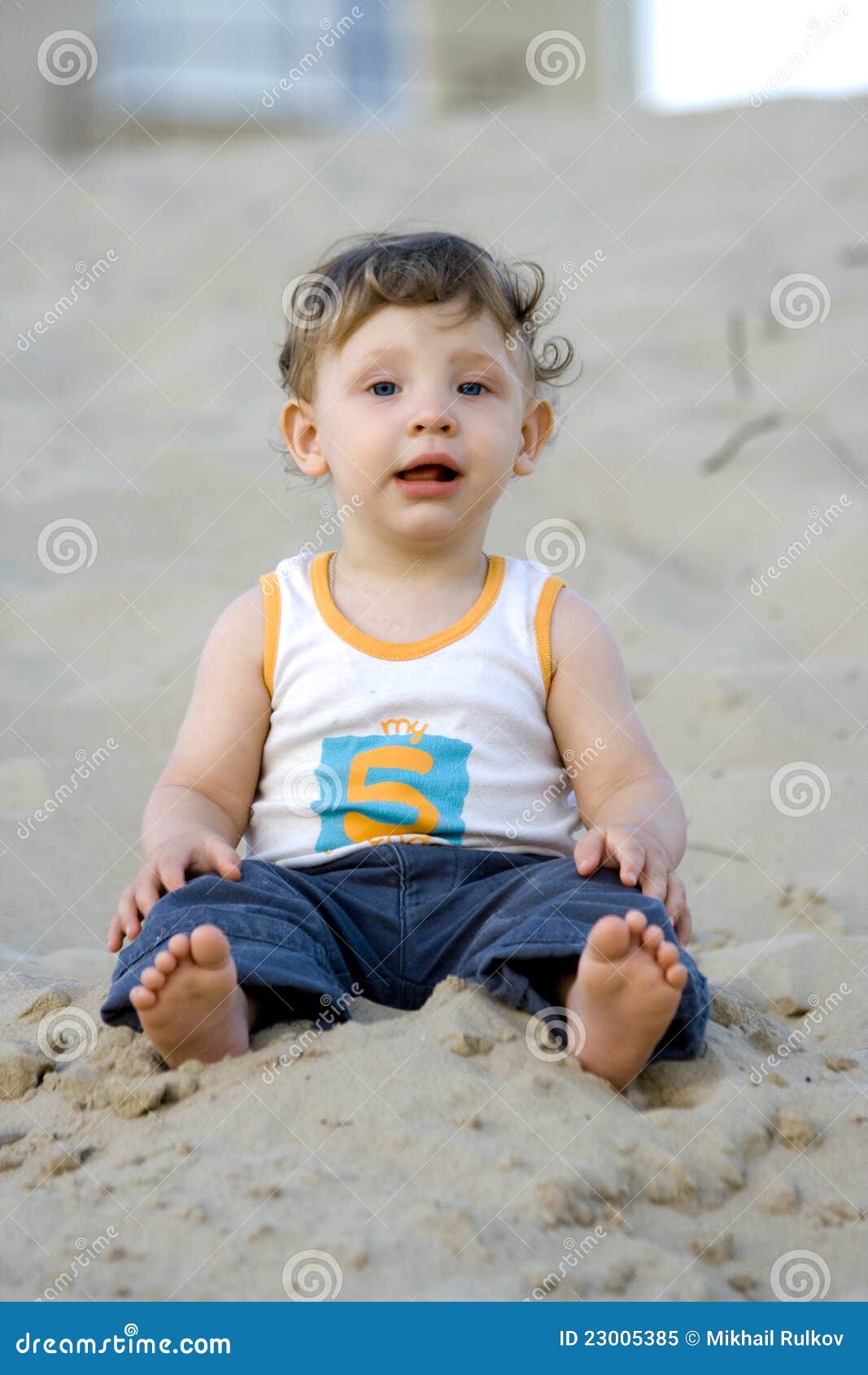 Boy on the sand stock image. Image of looking, cheerful - 23005385