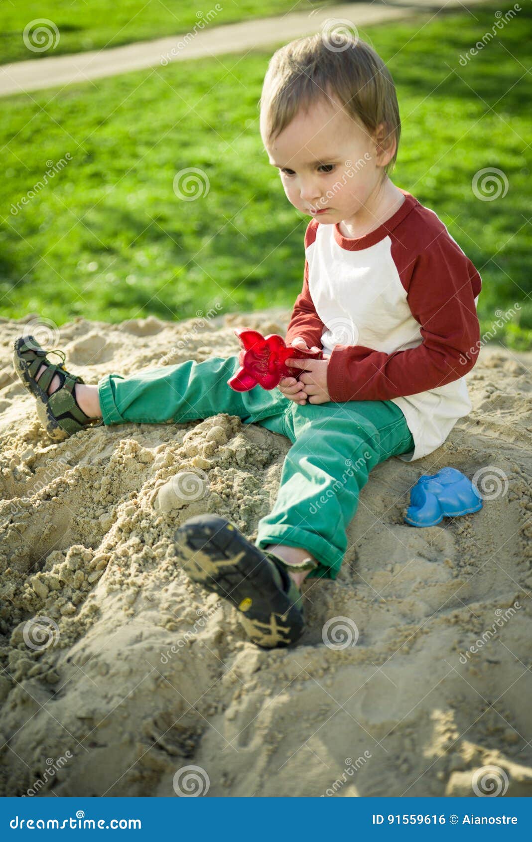 Boy and sand stock photo. Image of orange, playground - 91559616
