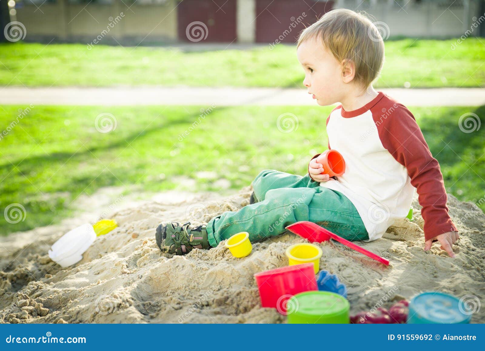 Boy and sand stock photo. Image of nature, play, bucket - 91559692