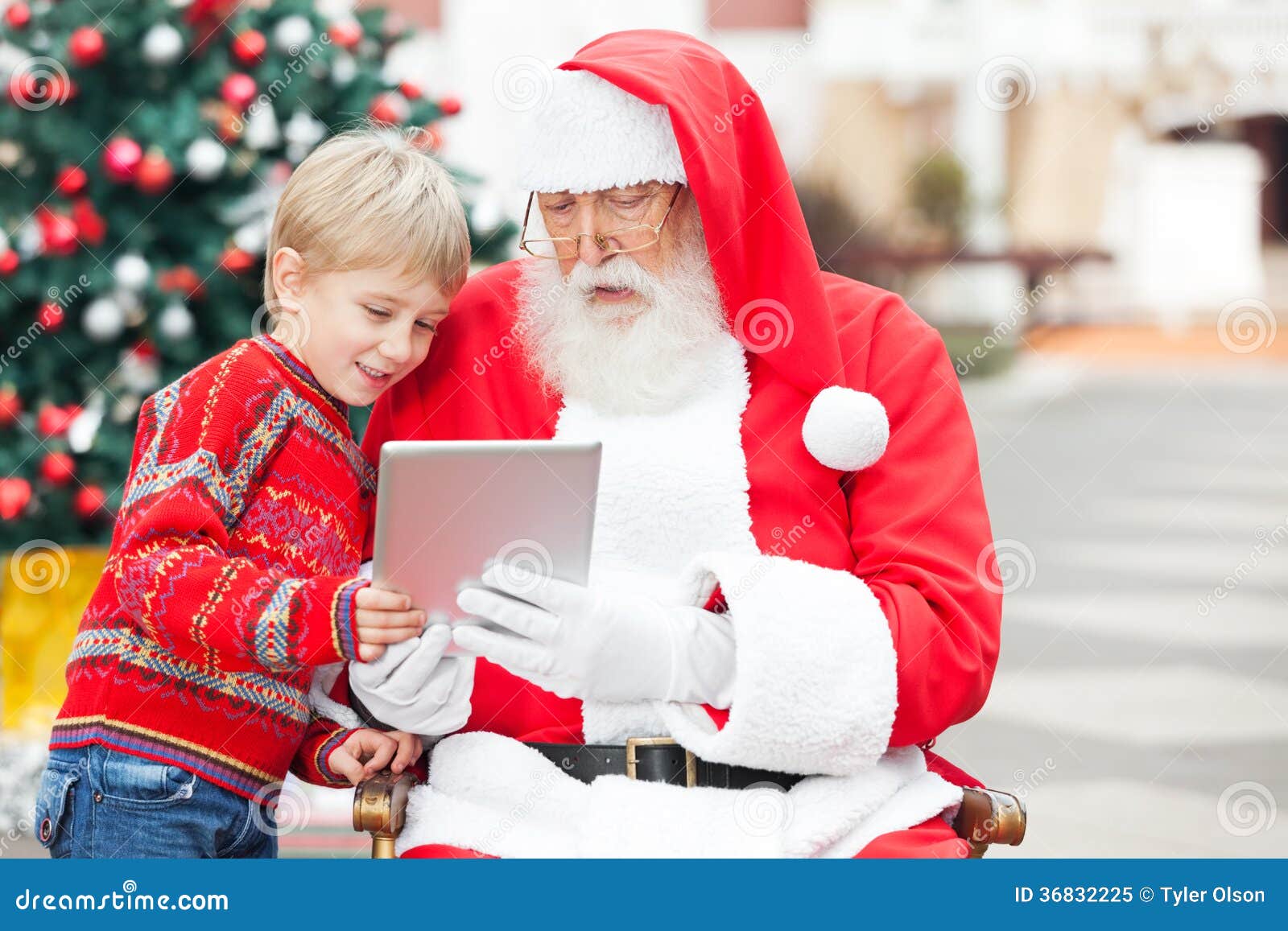 Boy and Santa Claus Using Digital Tablet Stock Image - Image of ...