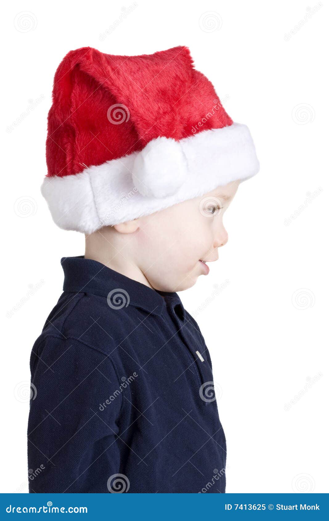 Boy in santa hat stock image. Image of hand, cute, eyes - 7413625