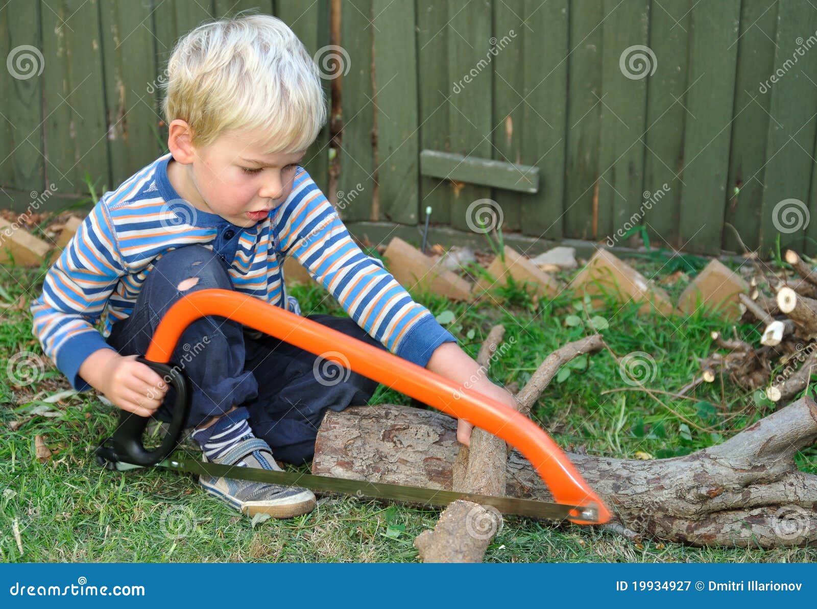 Boy sawing, seriously stock image. Image of tools, woodwork - 19934927