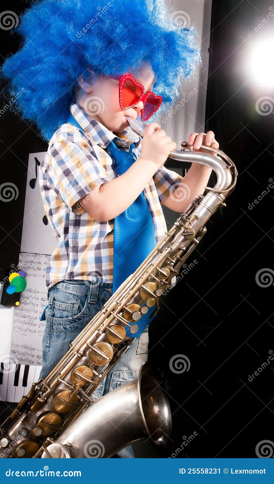 A boy with a saxophone stock image. Image of guitarist - 25558231