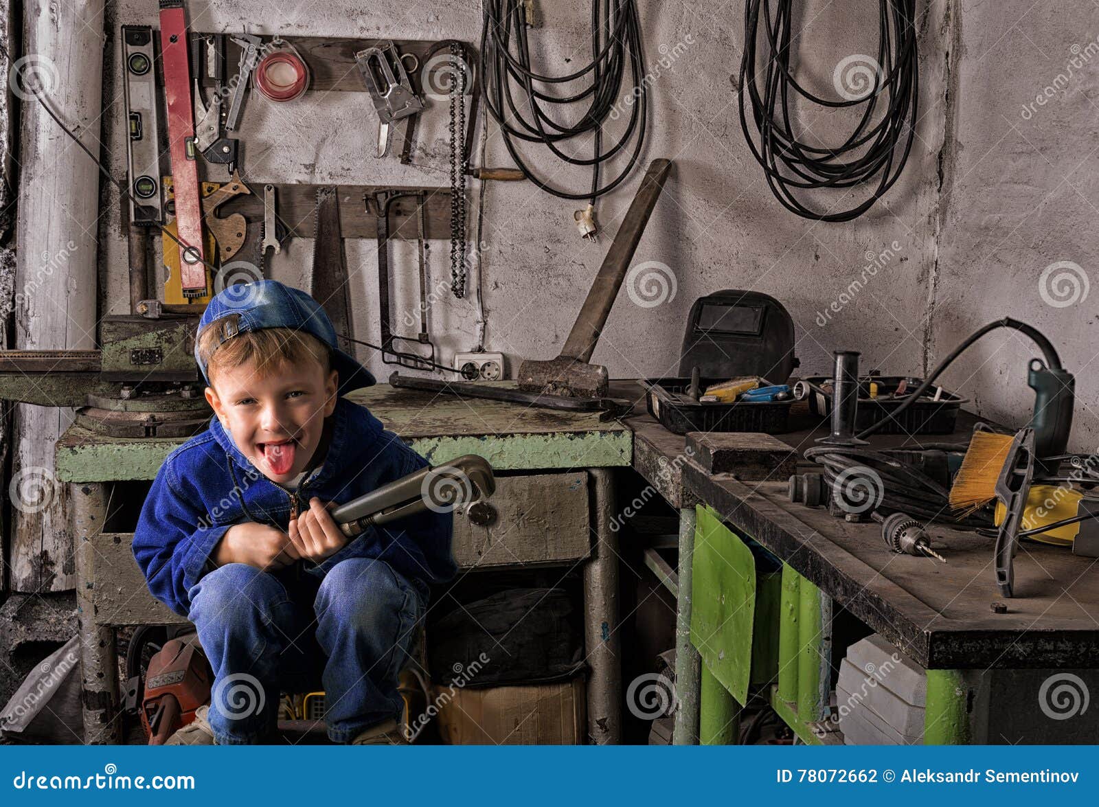 The Boy of School Age in the Metal Workshop Stock Photo - Image of ...