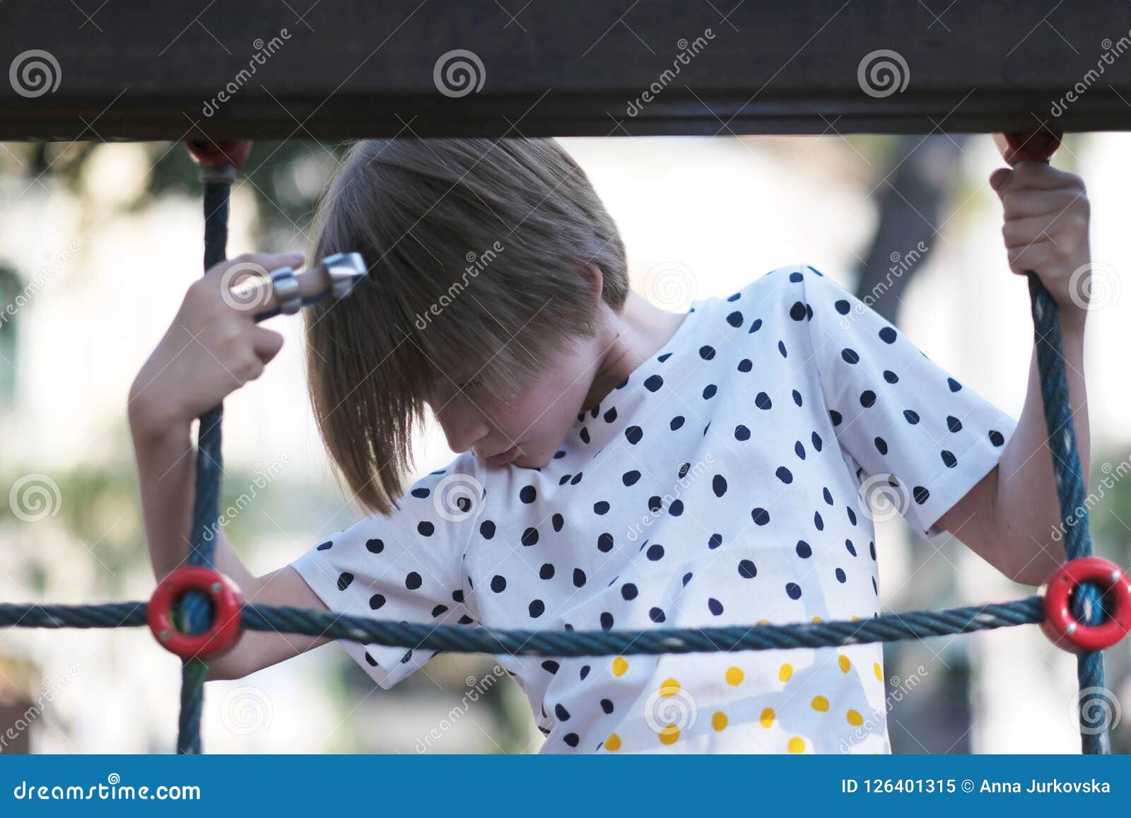 A Boy of School Age on a Ropeway Stock Image - Image of style ...