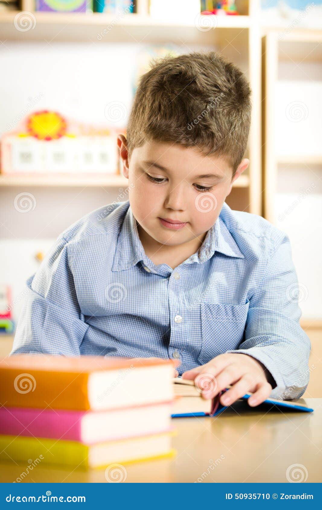 Boy at school stock photo. Image of pencil, elementary - 50935710