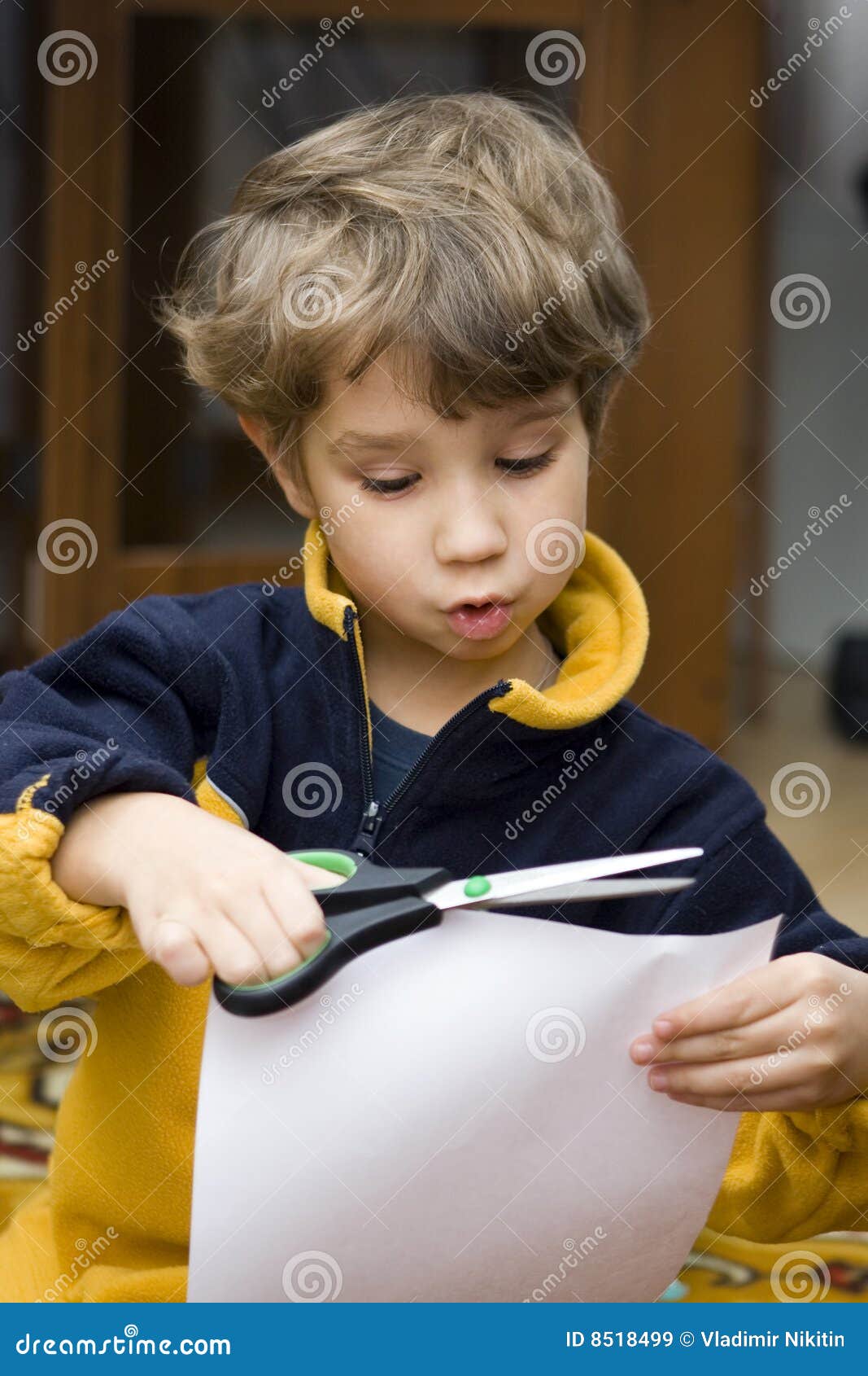 The boy and scissors stock image. Image of education, room - 8518499
