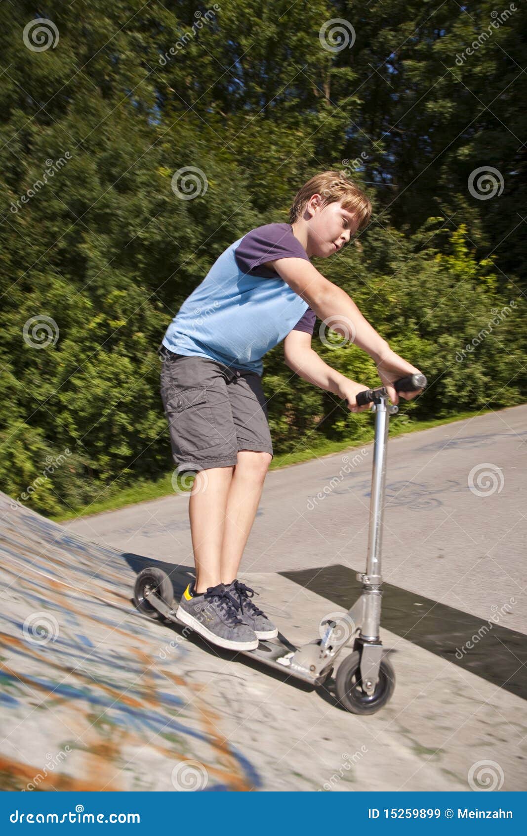 Boy is scooting stock image. Image of enthusiasm, action - 15259899