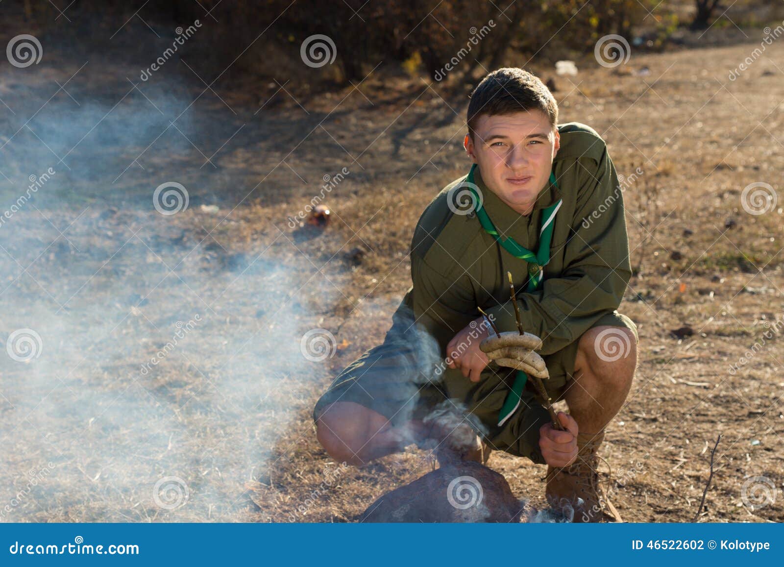 Boy Scout Making Fire on the Campground Stock Photo - Image of alight ...