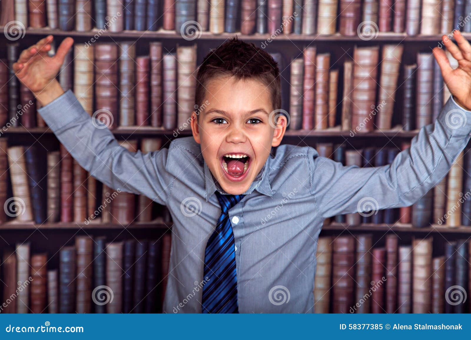 Boy screaming in library stock image. Image of globe - 58377385