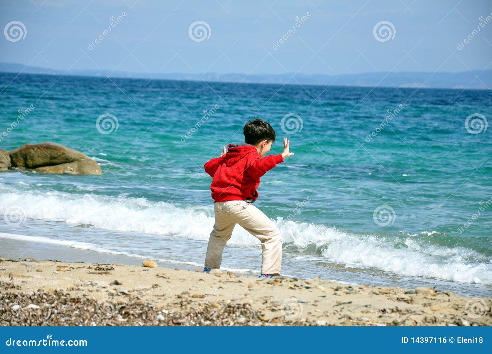 Boy by the sea 2 stock photo. Image of beach, expressive - 14397116