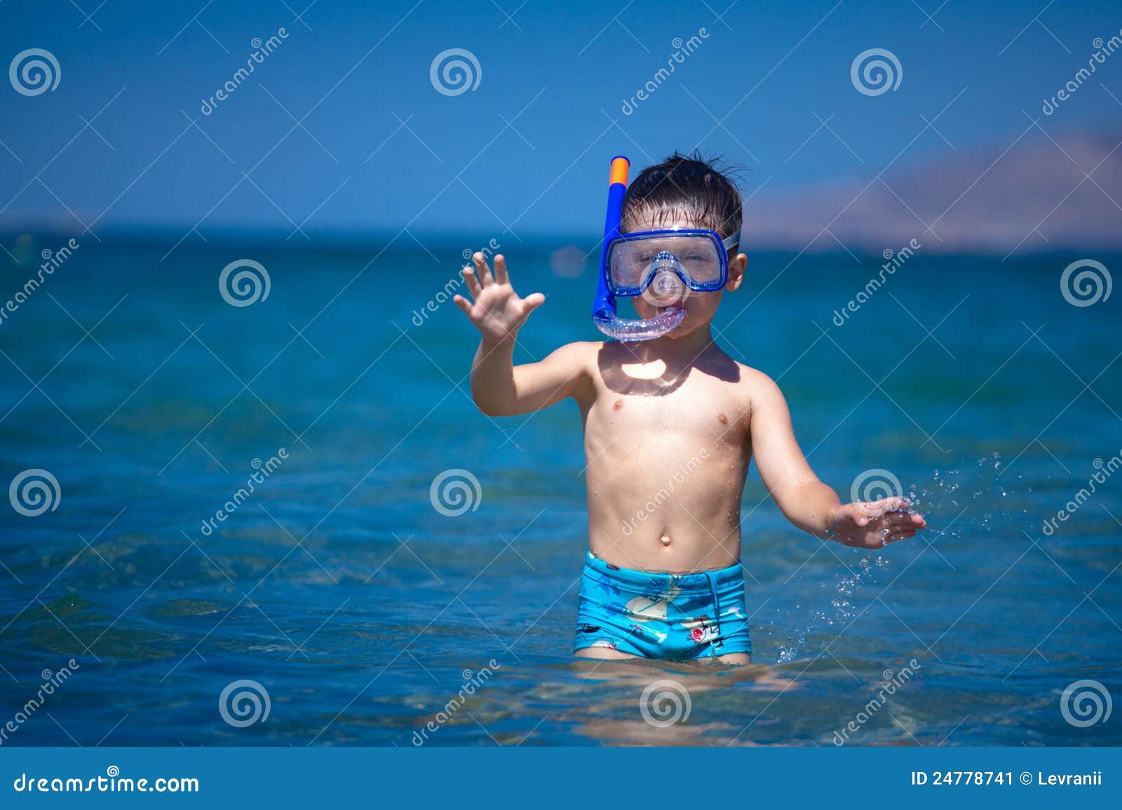 A Boy in a Sea with a Swimming Mask and Snorkel Stock Image - Image of ...