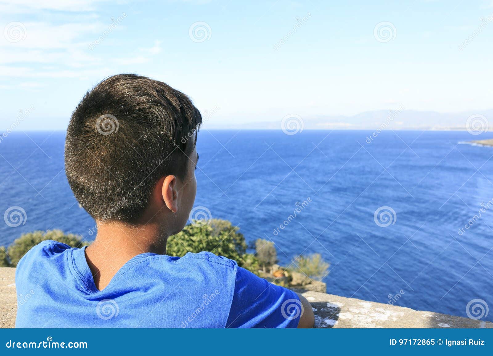 Boy seeing the blue sea stock image. Image of holiday - 97172865