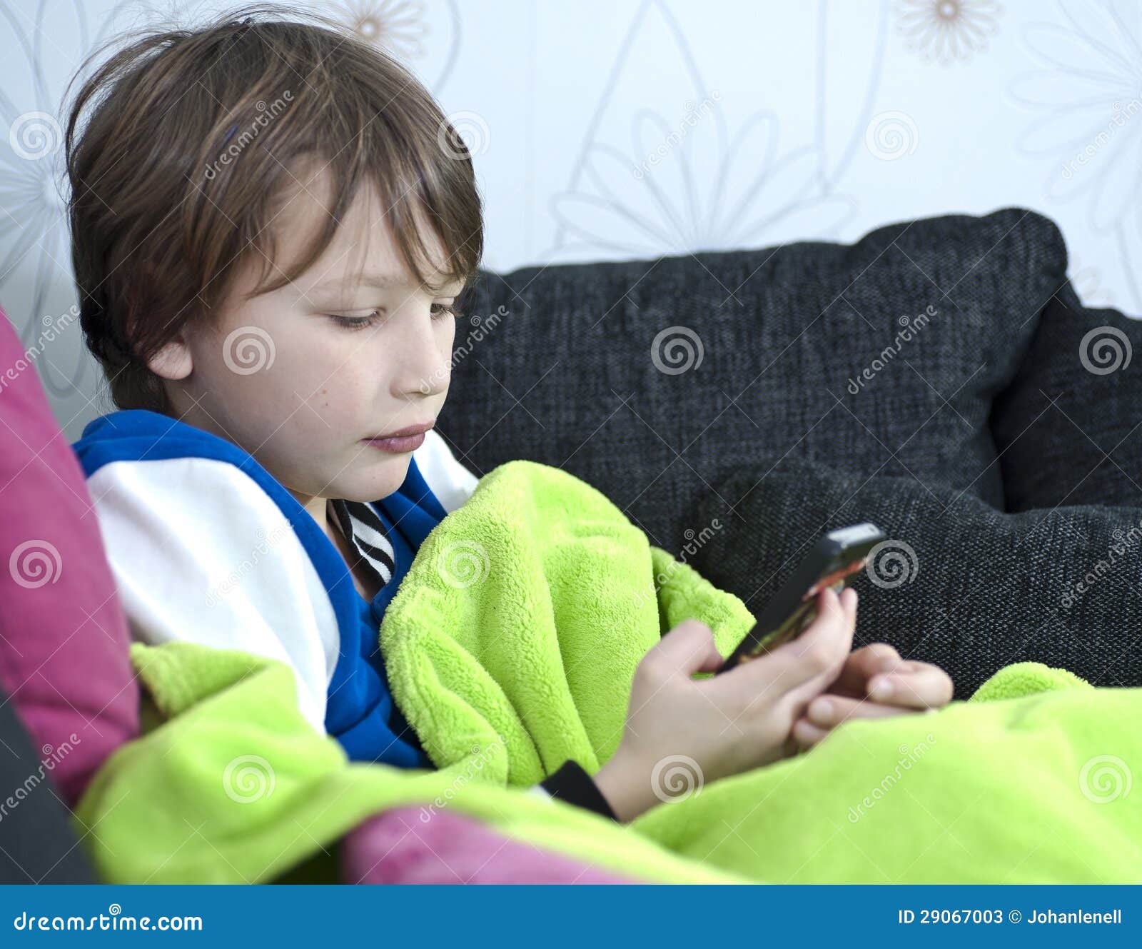 Boy sending text message stock image. Image of message - 29067003
