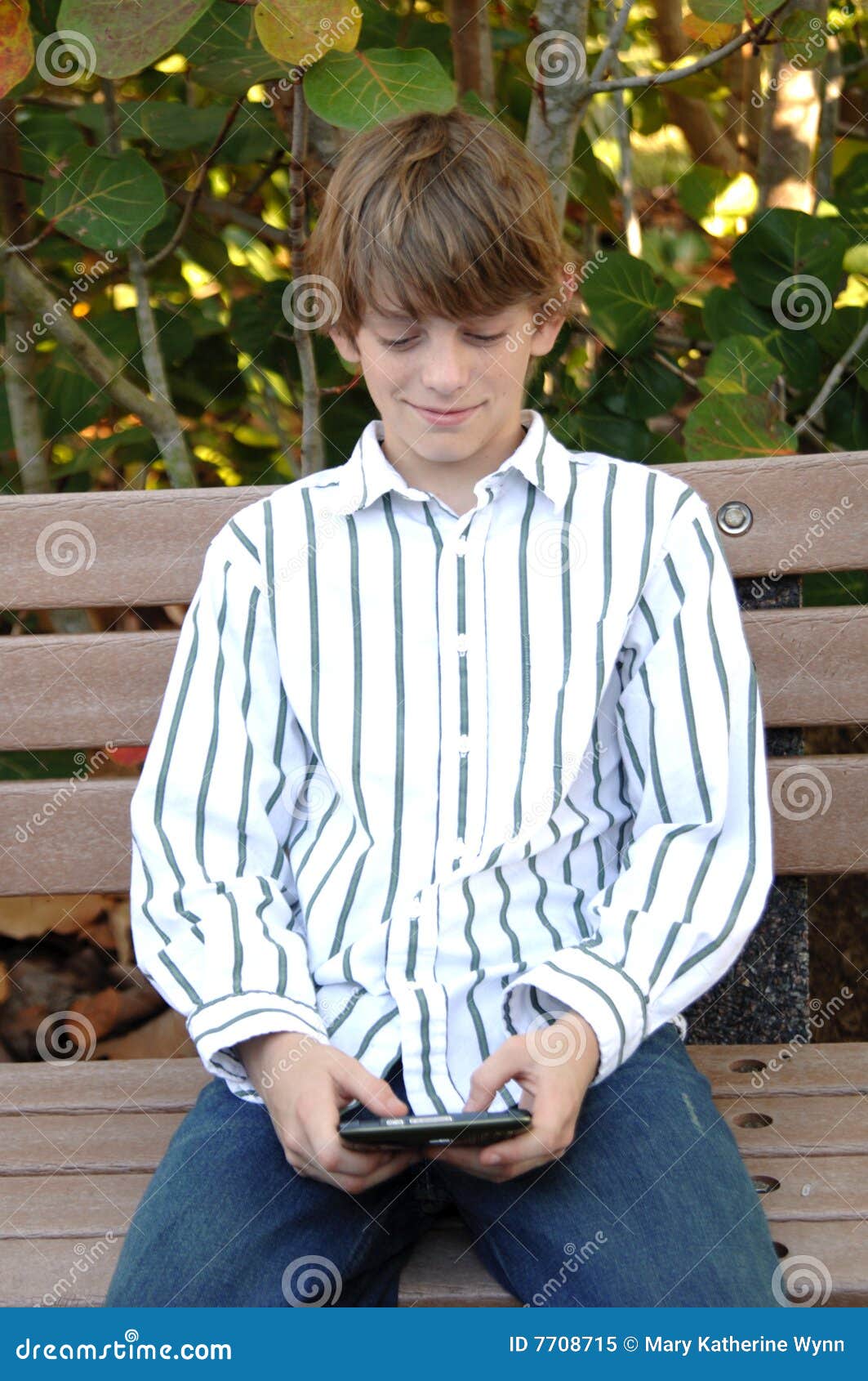 Boy sending text message stock image. Image of talk, smile - 7708715